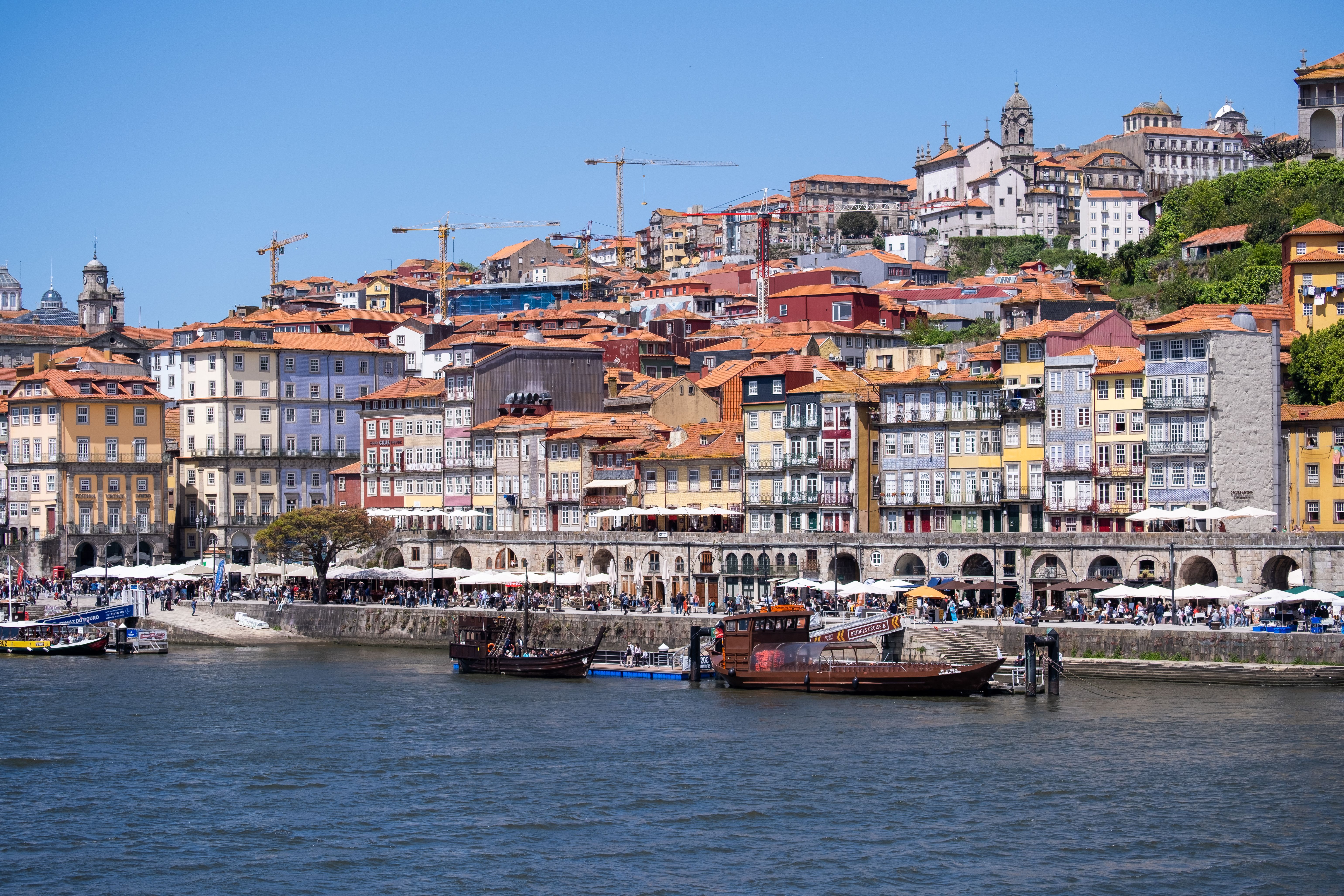 Vibrant Ribeira District Waterfront in Porto · Free Stock Photo