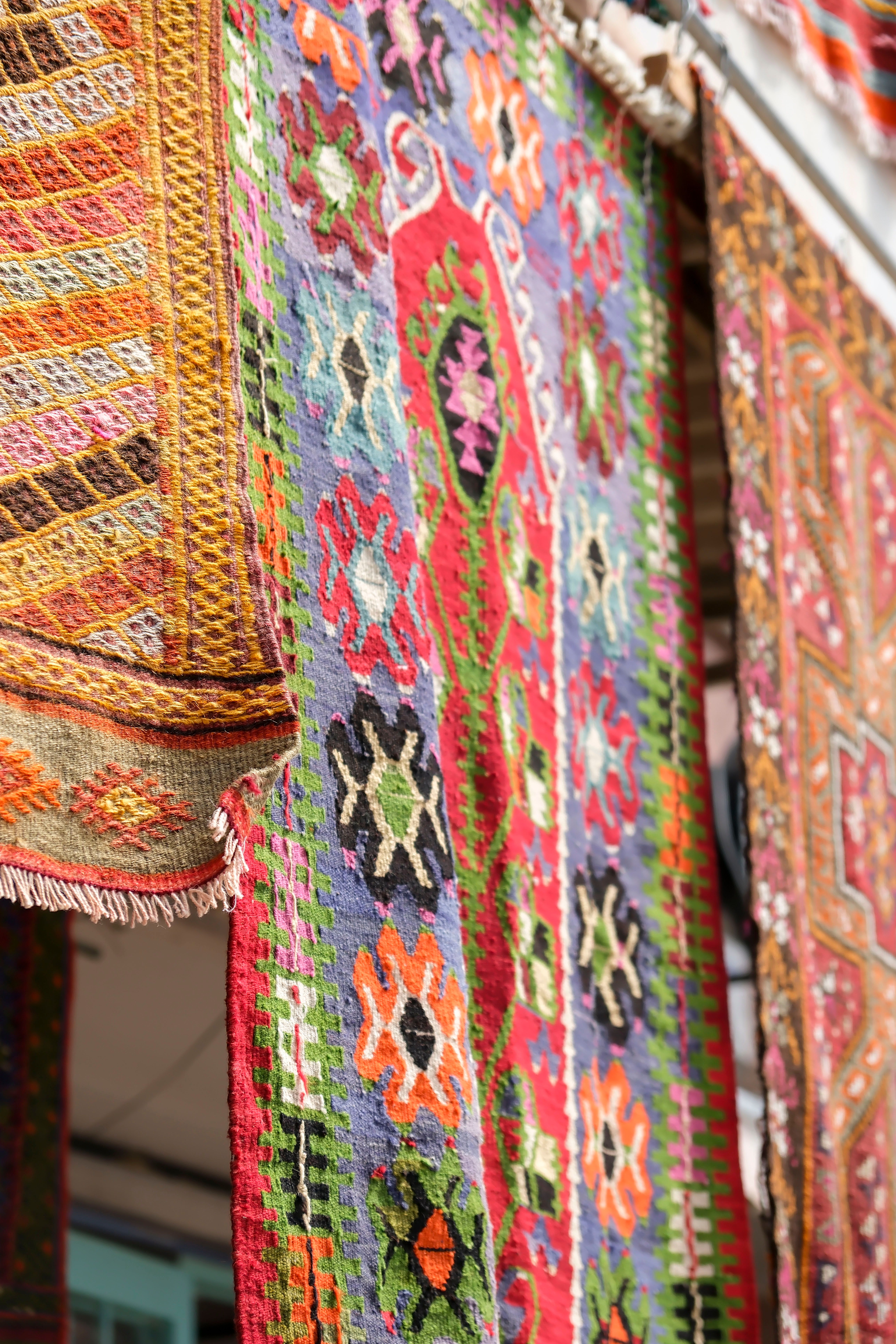 Vibrant Traditional Turkish Carpets on Display · Free Stock Photo