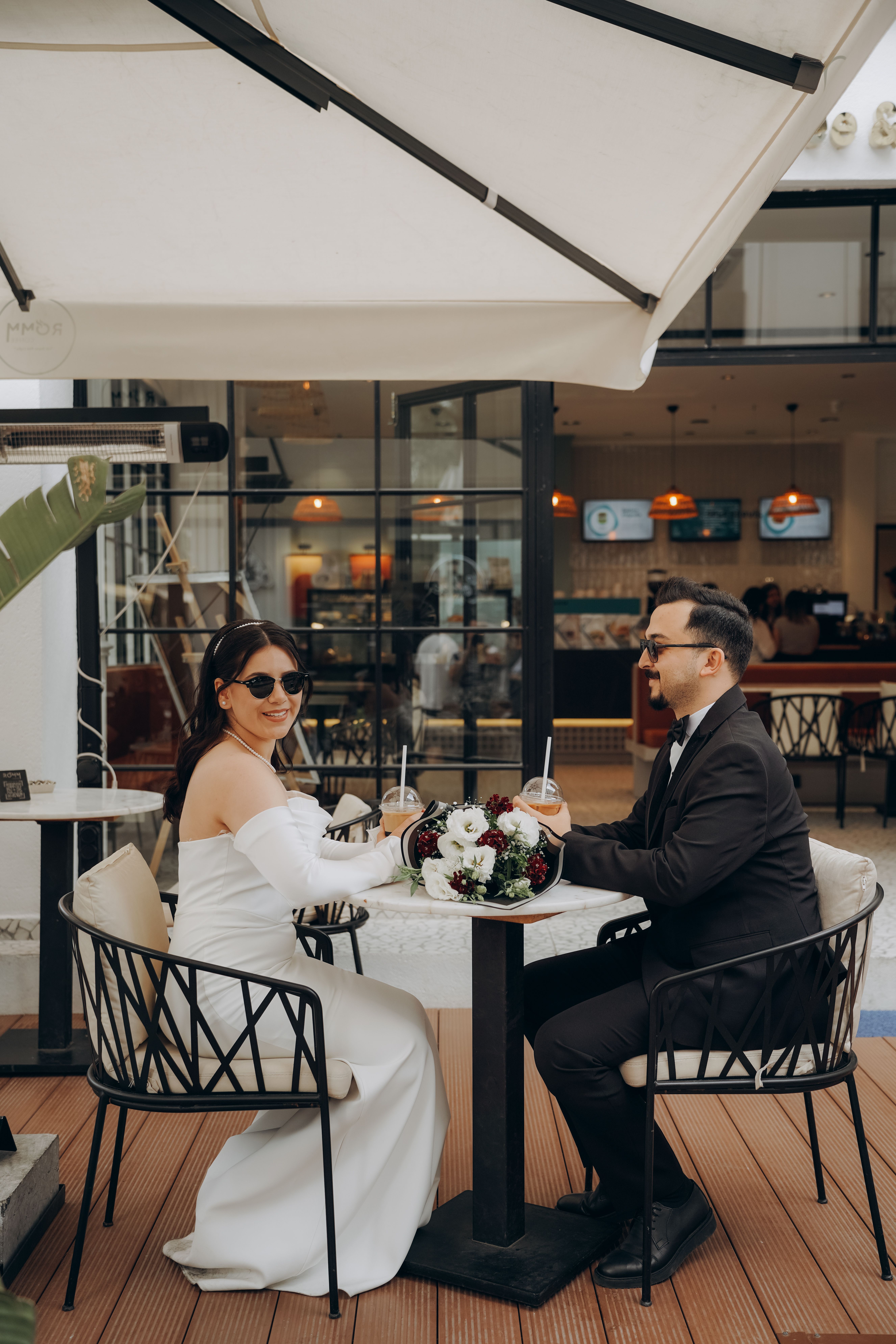 Elegant Couple Dining Outdoors at a Cafe · Free Stock Photo
