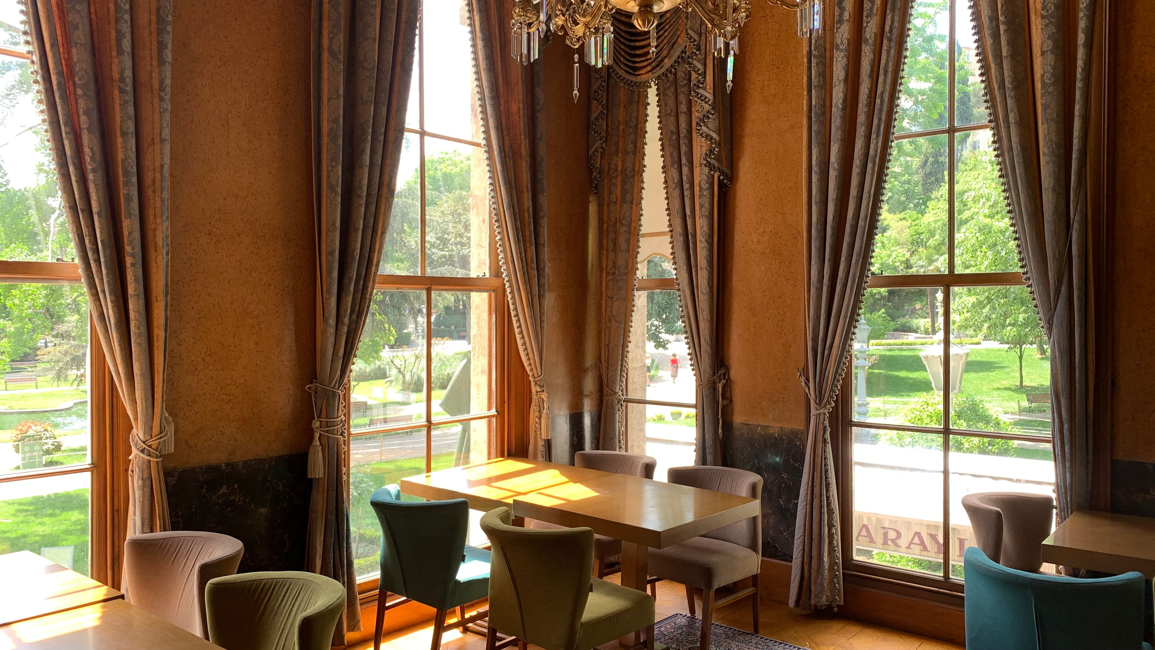 Luxurious Café Interior with Large Windows · Free Stock Photo