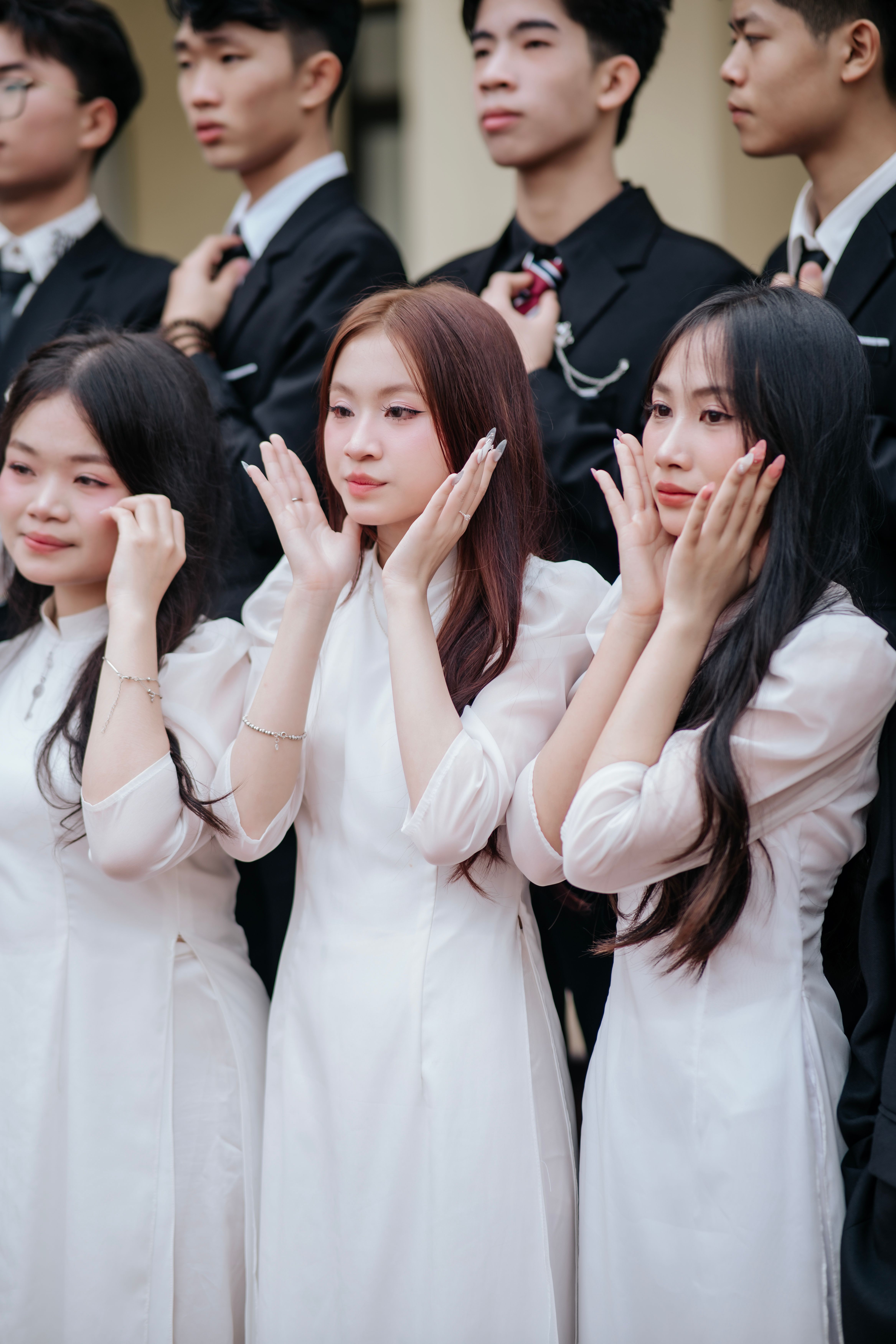 Elegant Group of Young Adults in Formal Attire · Free Stock Photo