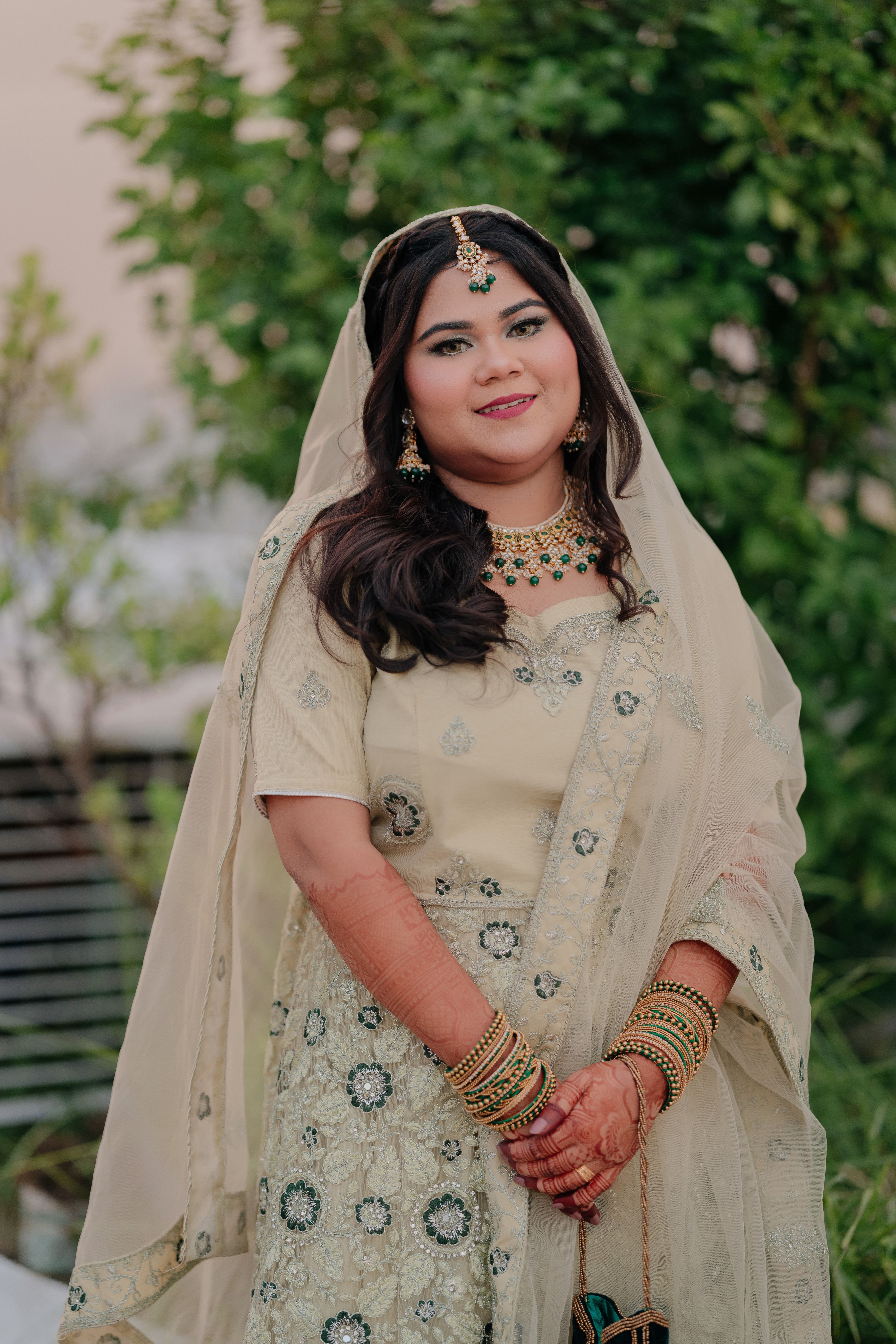 Bride in Traditional Wedding Attire Smiling · Free Stock Photo