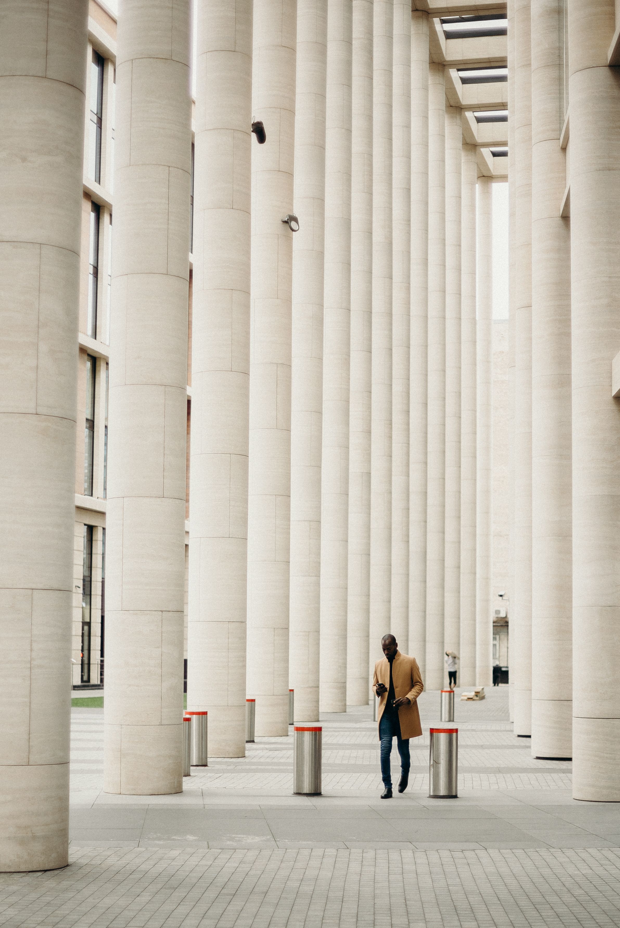 Man Leaning on Post · Free Stock Photo