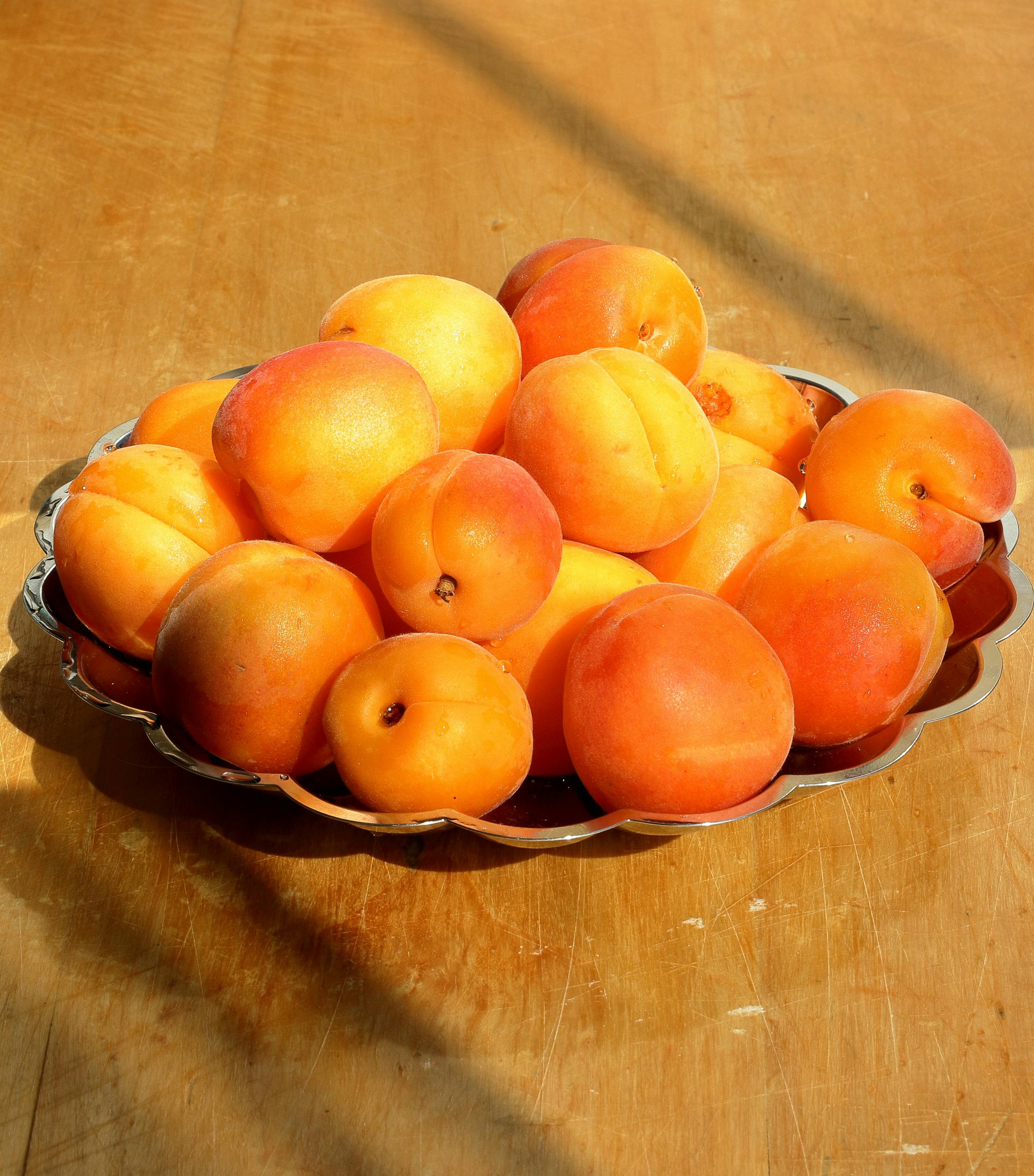 Fresh Apricots on a Wooden Table · Free Stock Photo