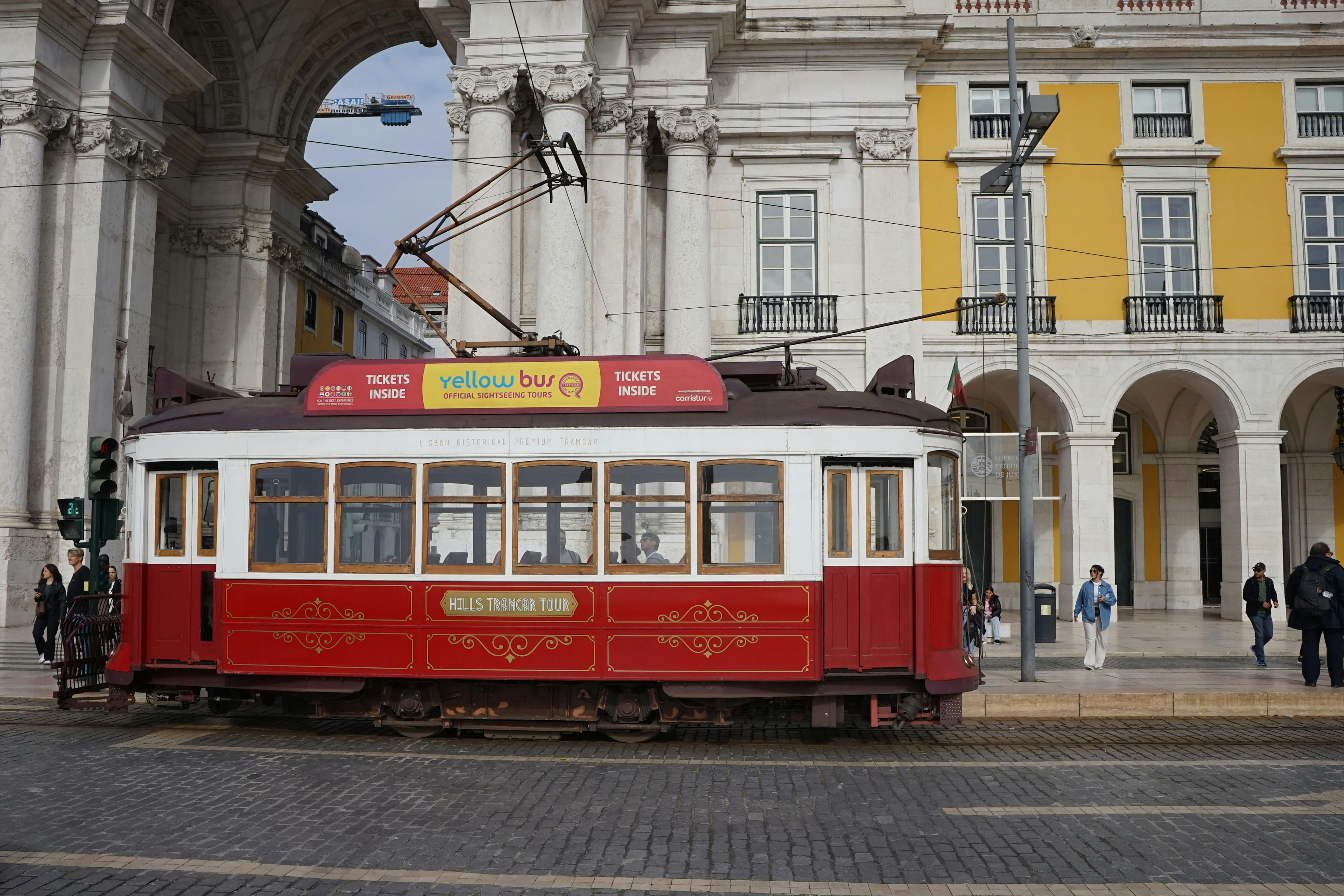 Iconic Lisbon Tram Under Arco da Rua Augusta · Free Stock Photo