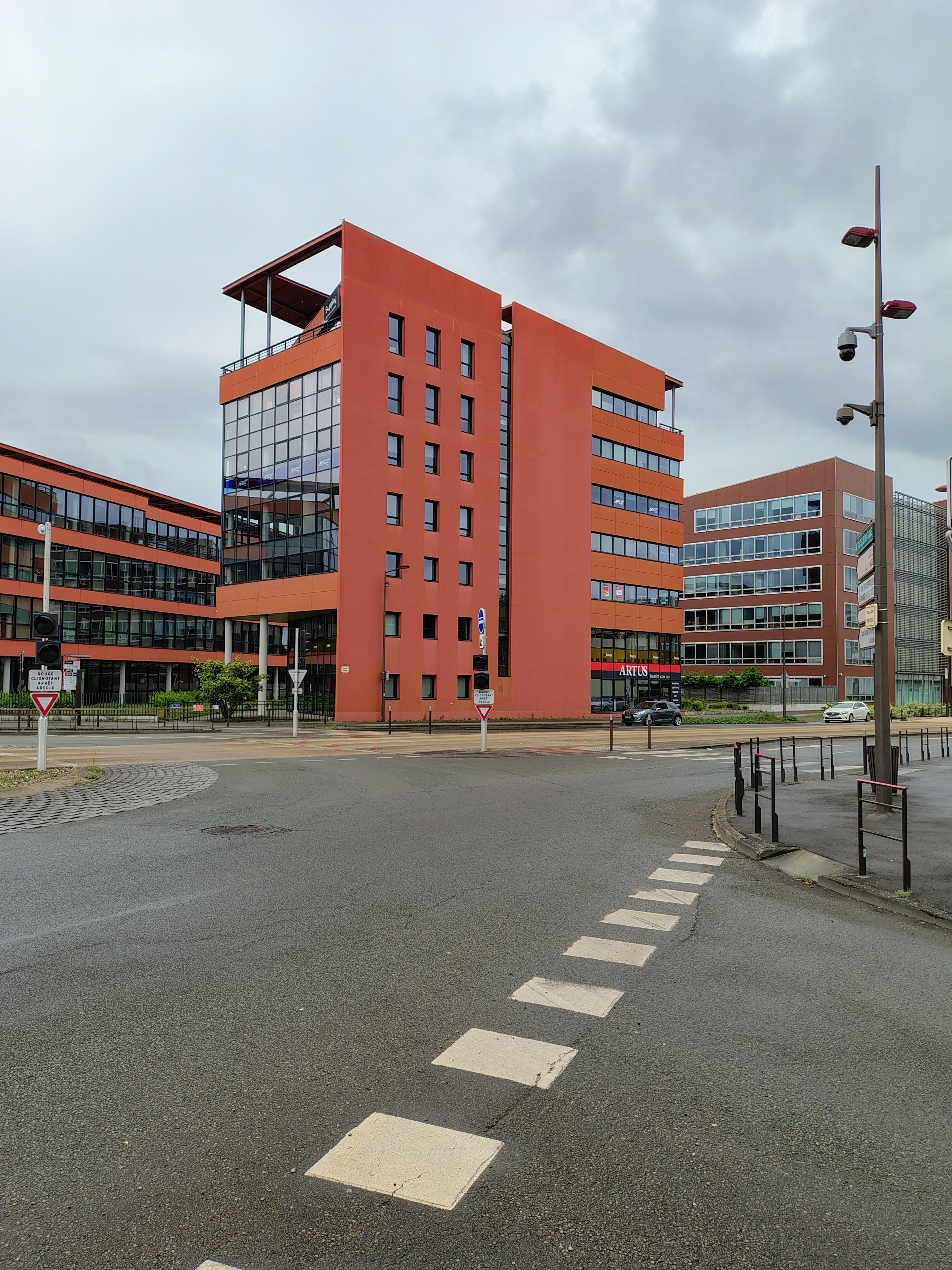 Modern Urban Office Buildings on Cloudy Day · Free Stock Photo