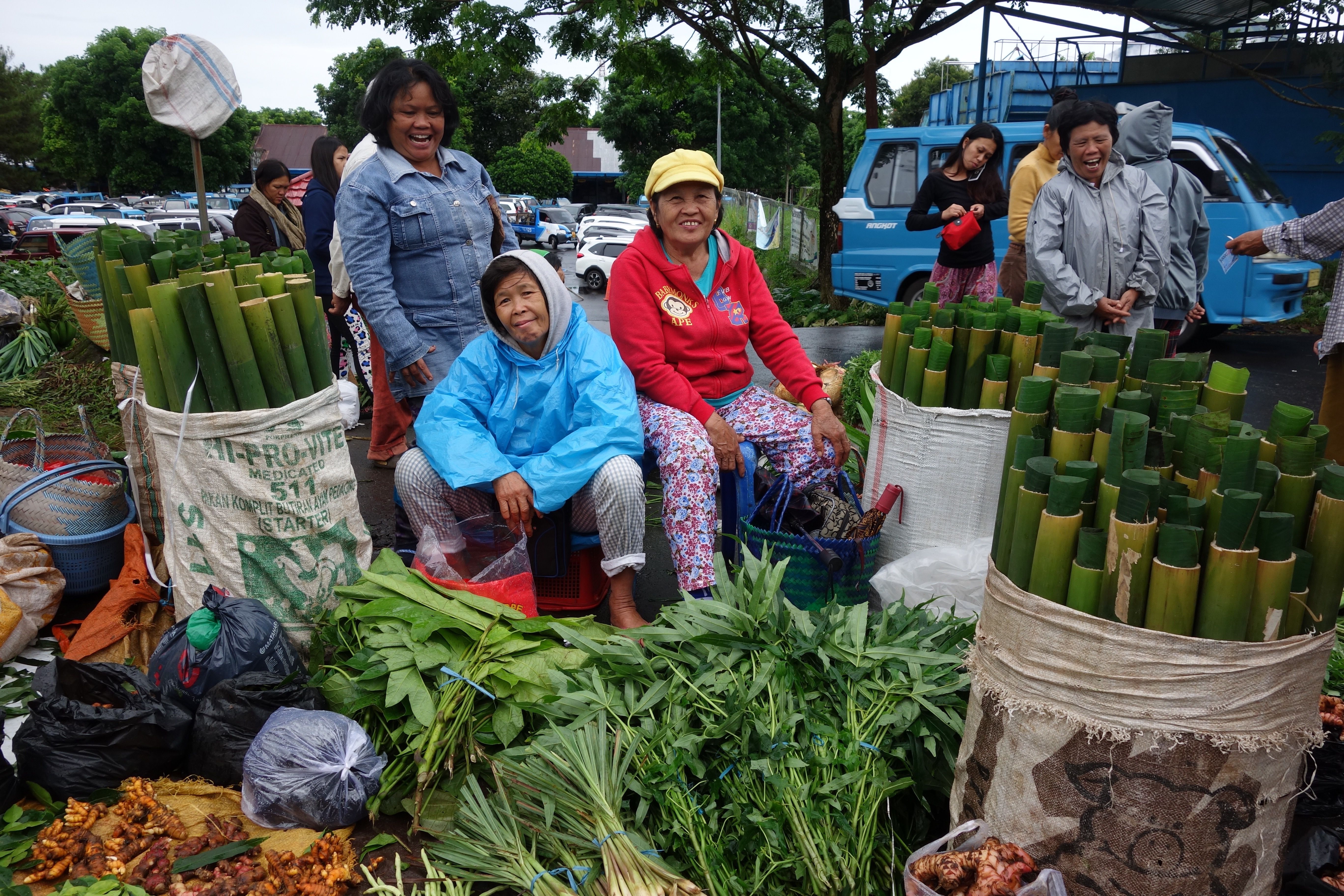 Women Selling Fresh Produce at Outdoor Market · Free Stock Photo