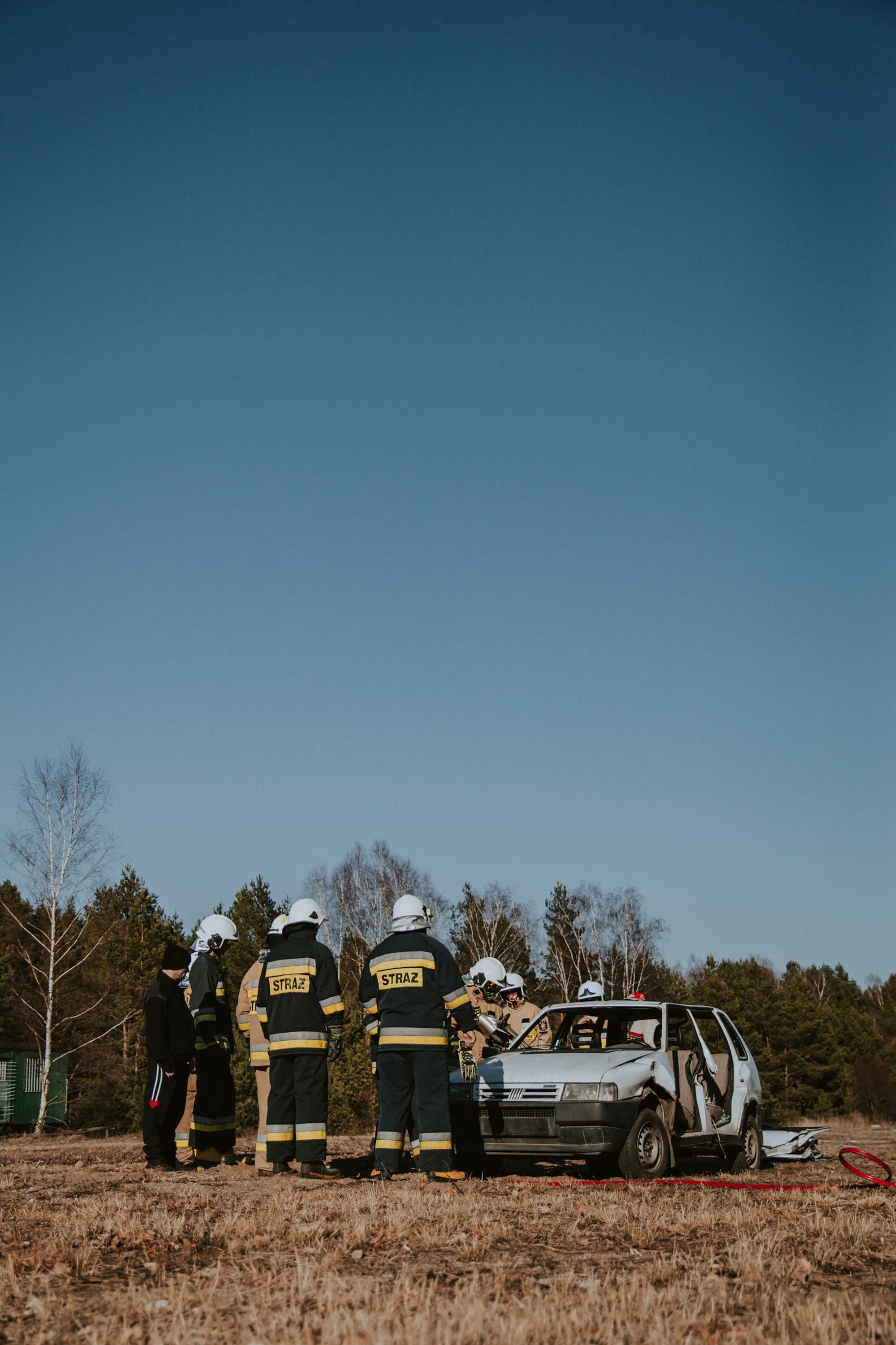 Firefighter Training Exercise in Polish Field · Free Stock Photo