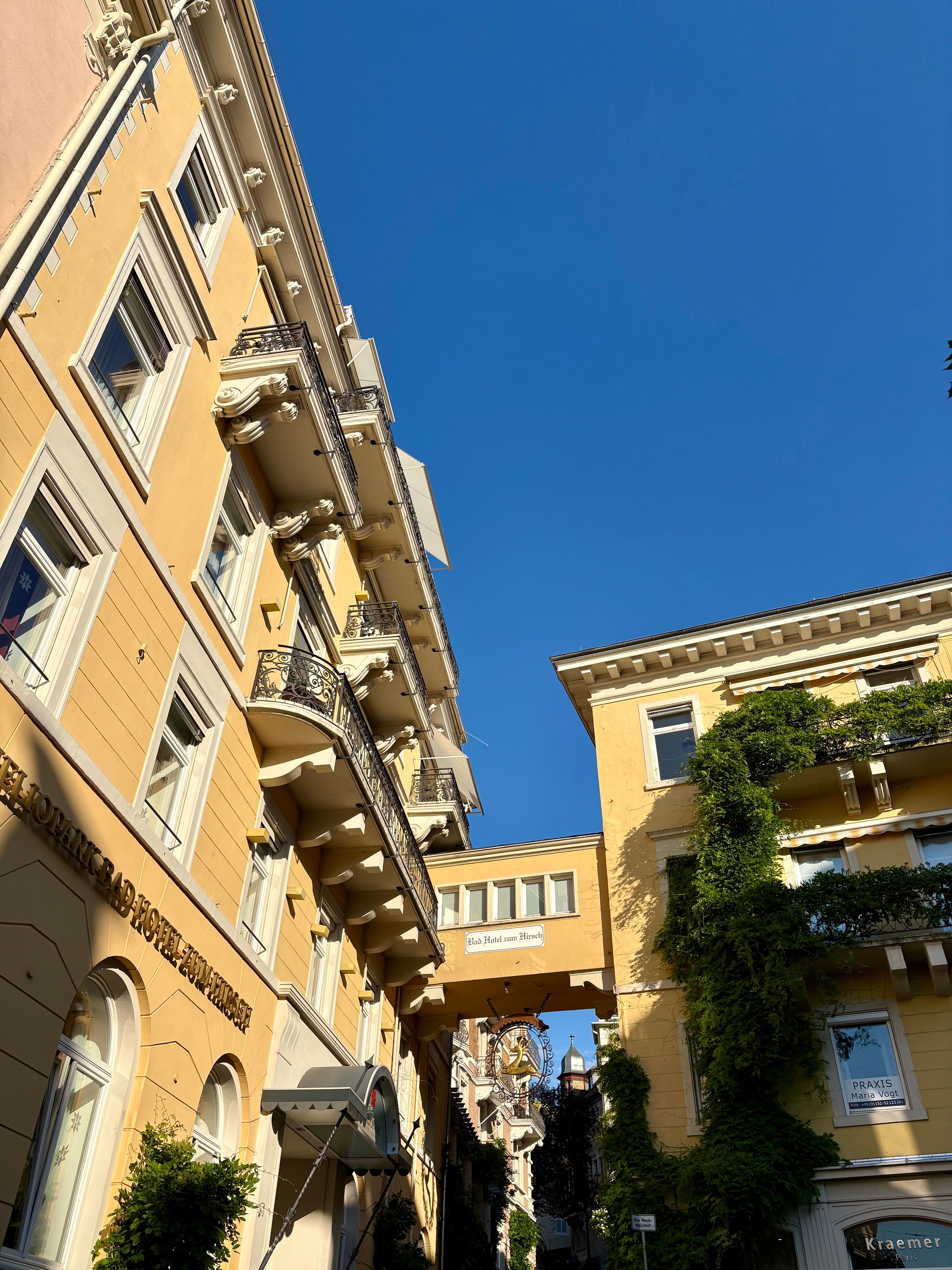 Yellow Buildings under Clear Blue Sky in Europe · Free Stock Photo