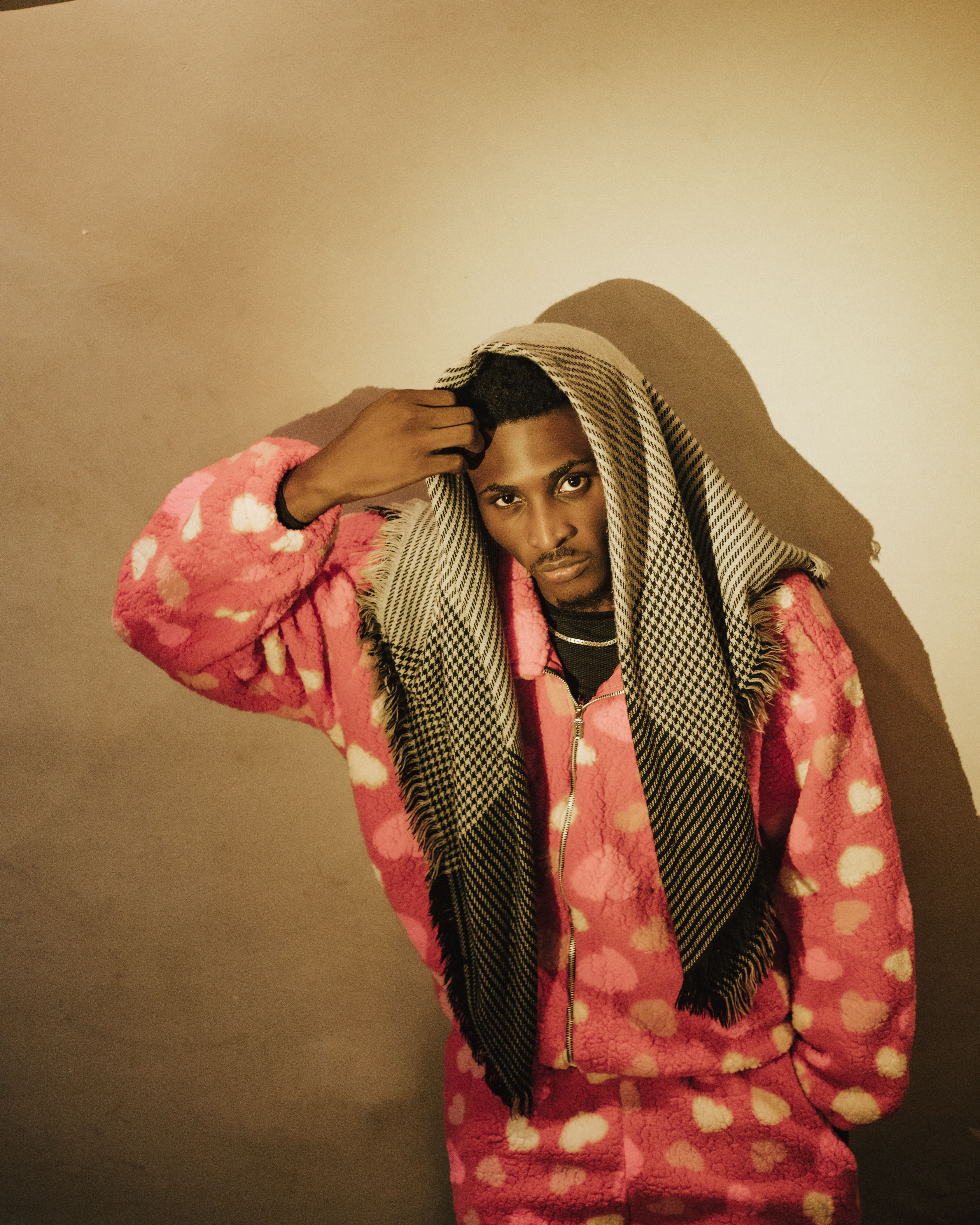 Stylish Fashion Portrait of a Man in Pink Attire · Free Stock Photo