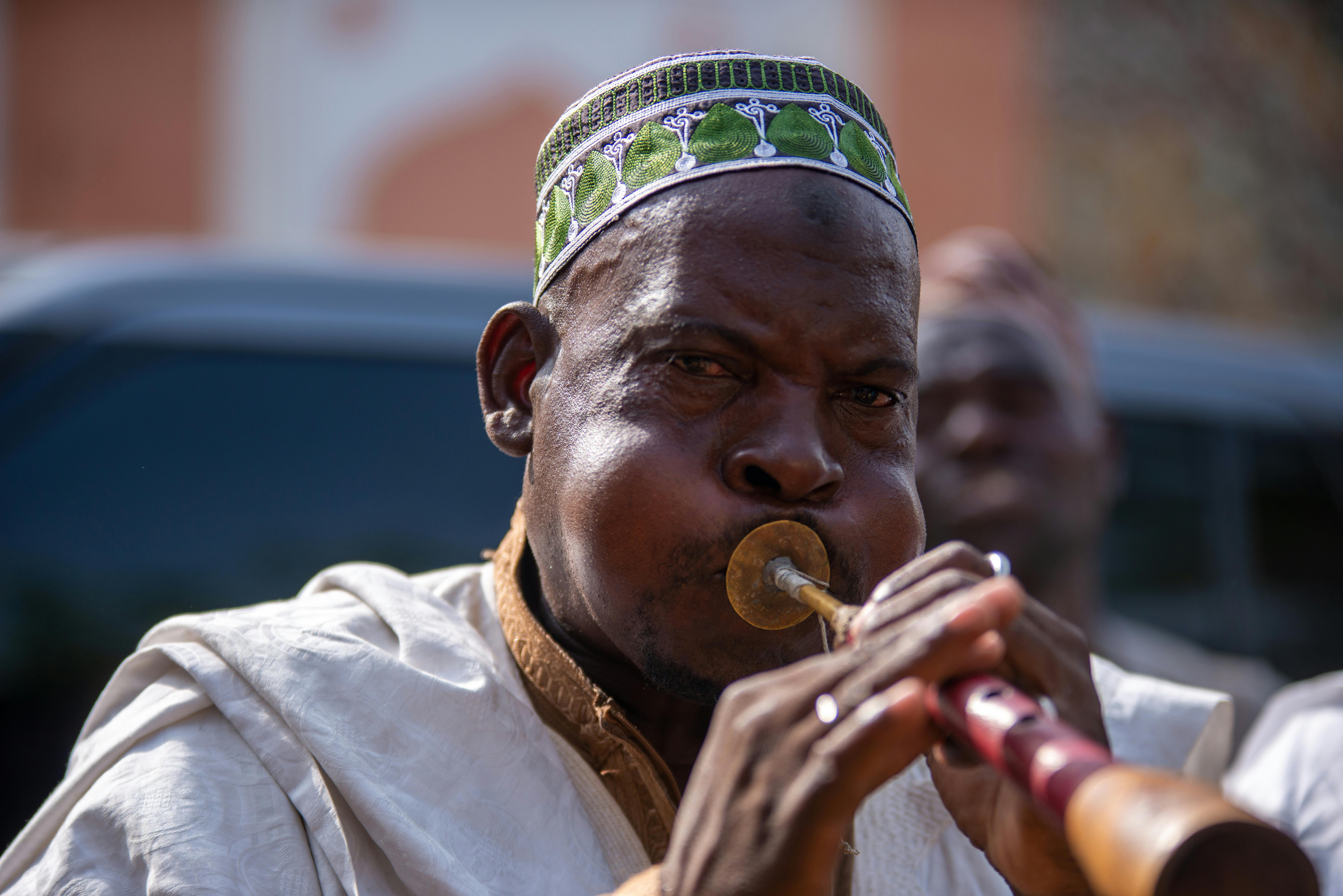 African Musician Playing Traditional Wind Instrument · Free Stock Photo