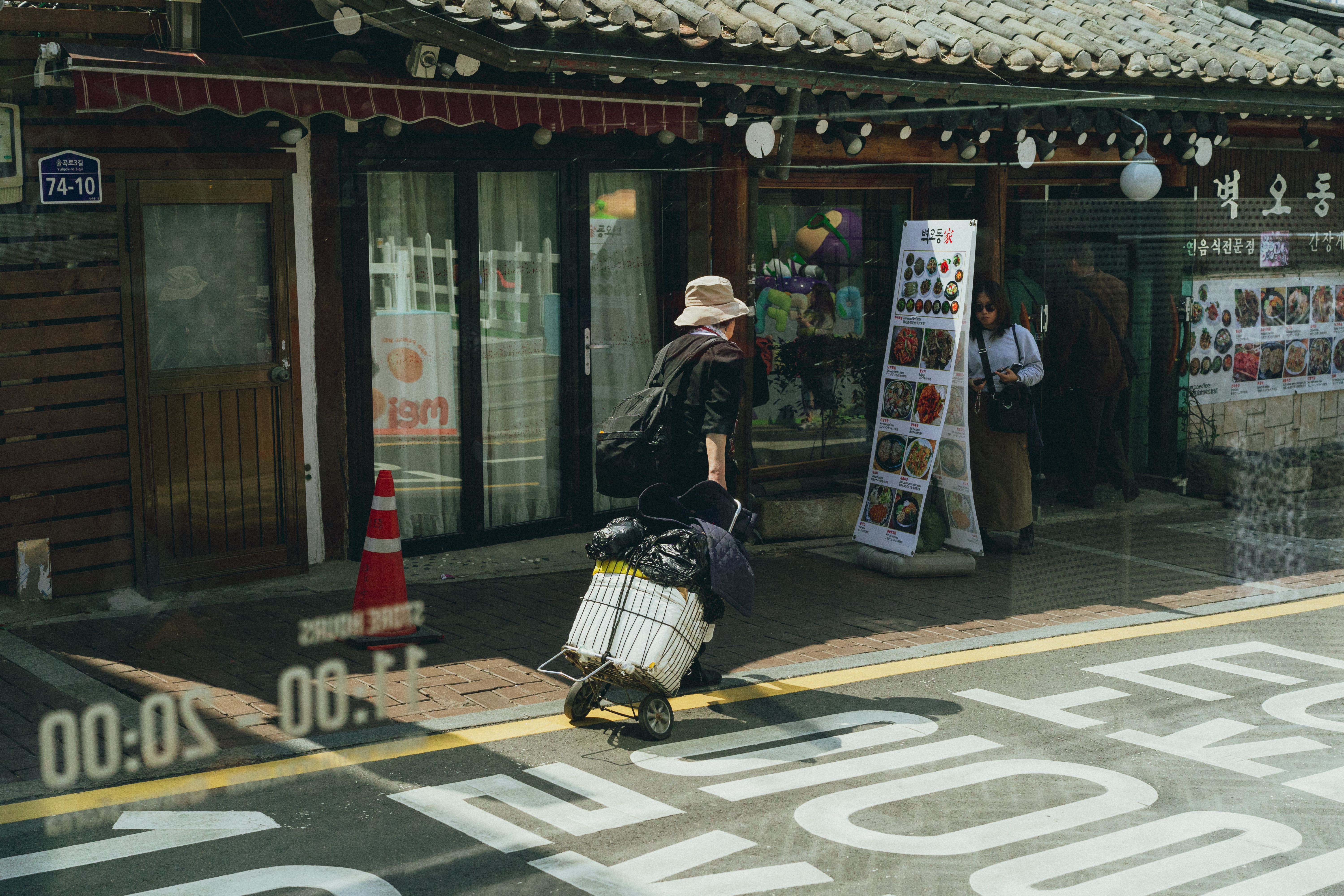 Street Life in Seoul Captured on a Sunny Day · Free Stock Photo