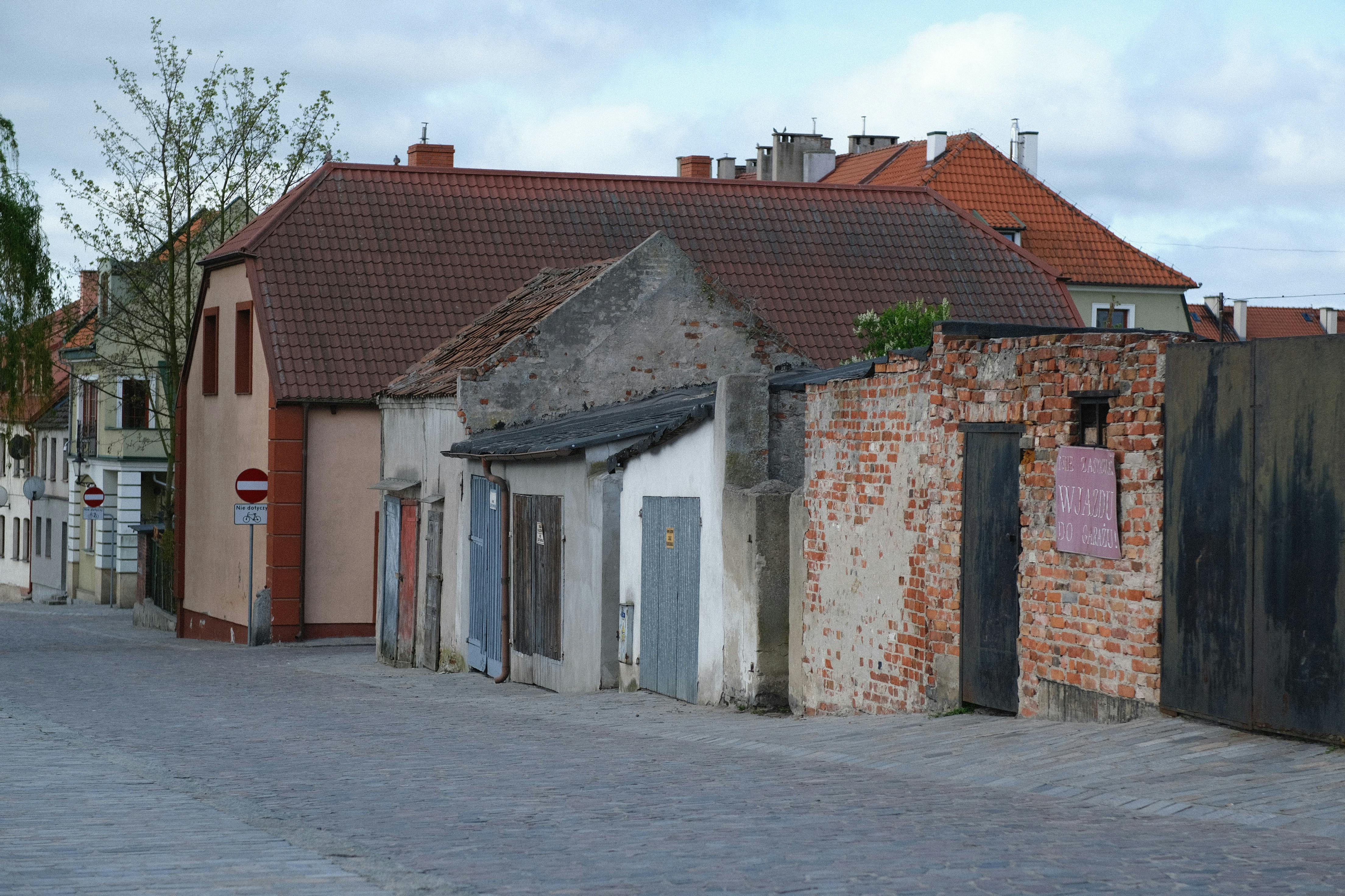 Historic Street View with Old Brick Buildings · Free Stock Photo