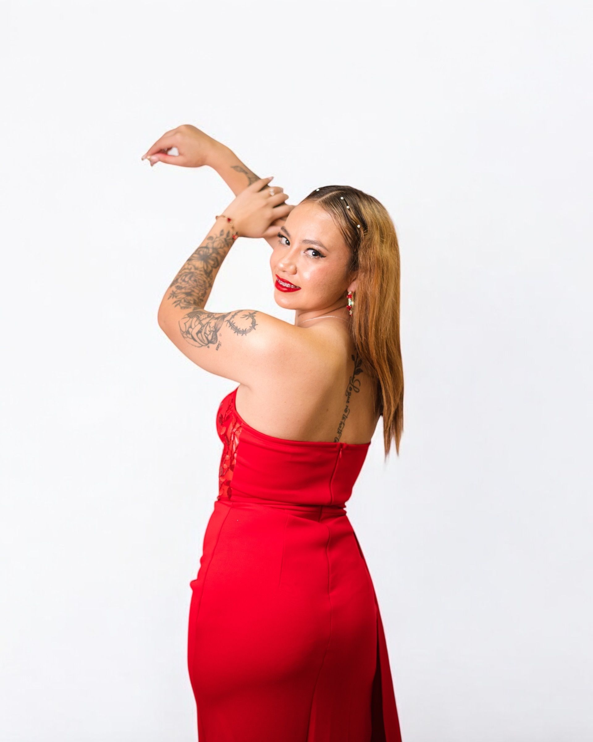Elegant Woman in Red Dress with Tattoos · Free Stock Photo