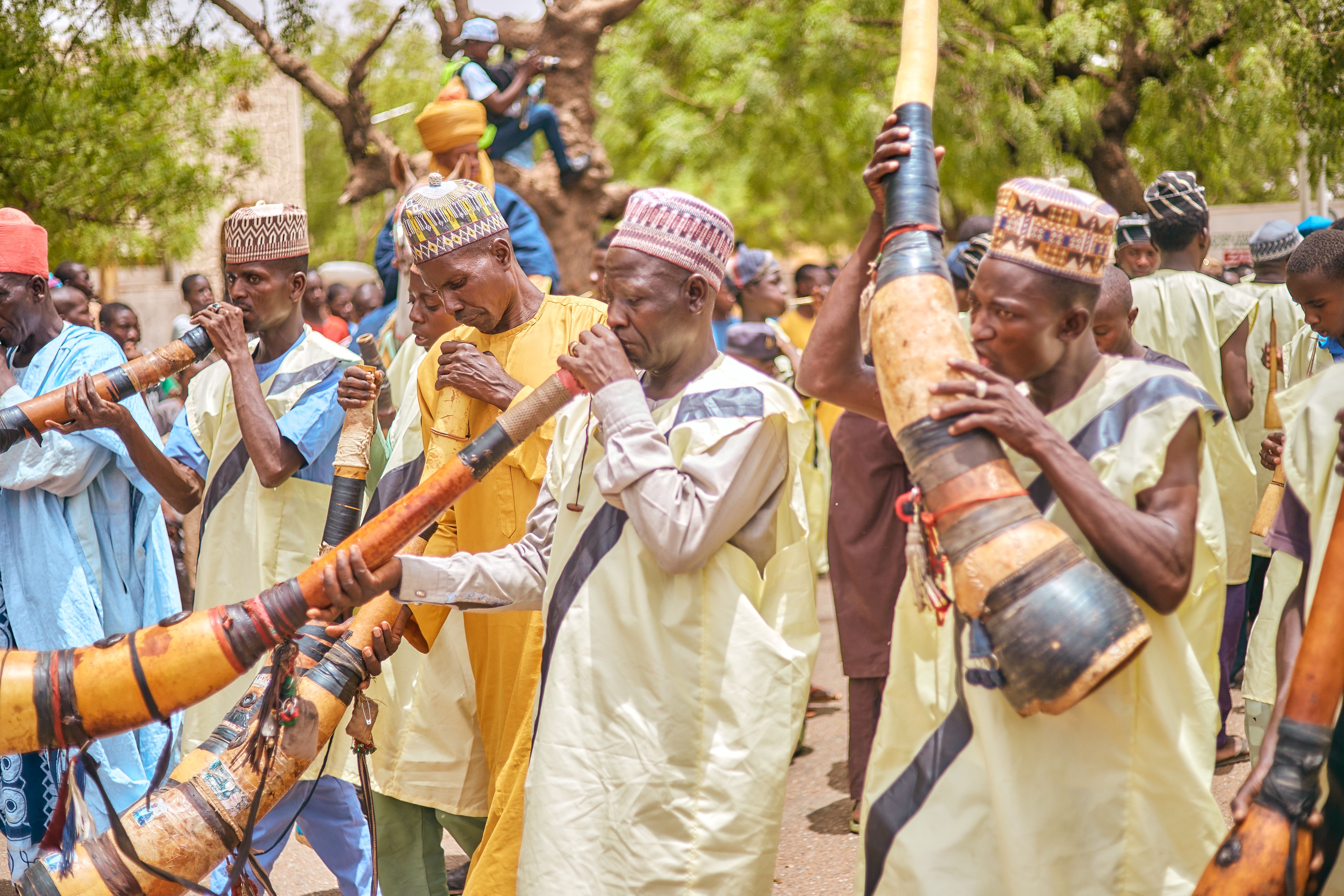Traditional African Horn Players in Festival Parade · Free Stock Photo
