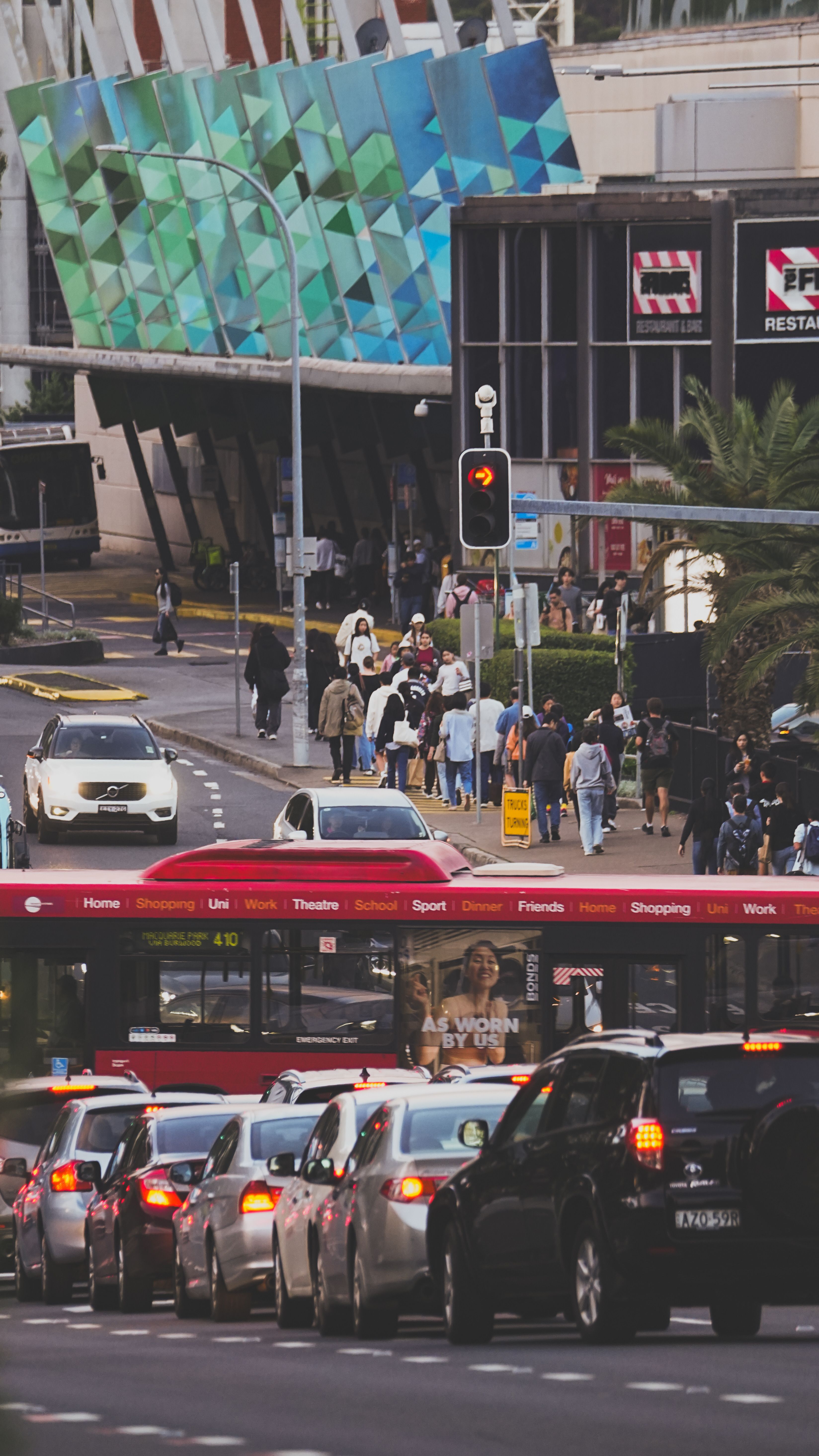 Busy Urban Intersection with Traffic and Pedestrians · Free Stock Photo