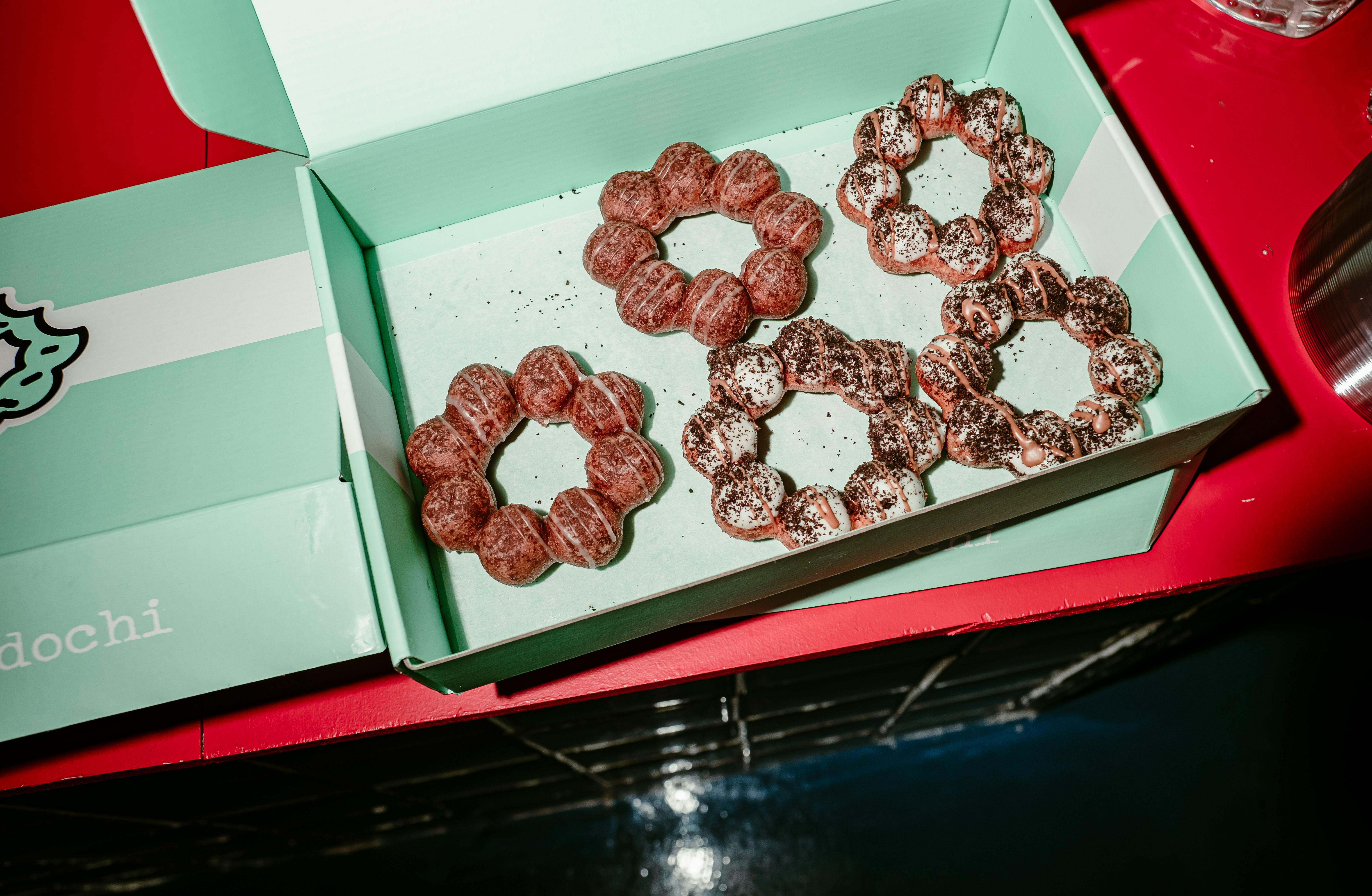 Box of Tasty Mochi Donuts in Assorted Flavors · Free Stock Photo