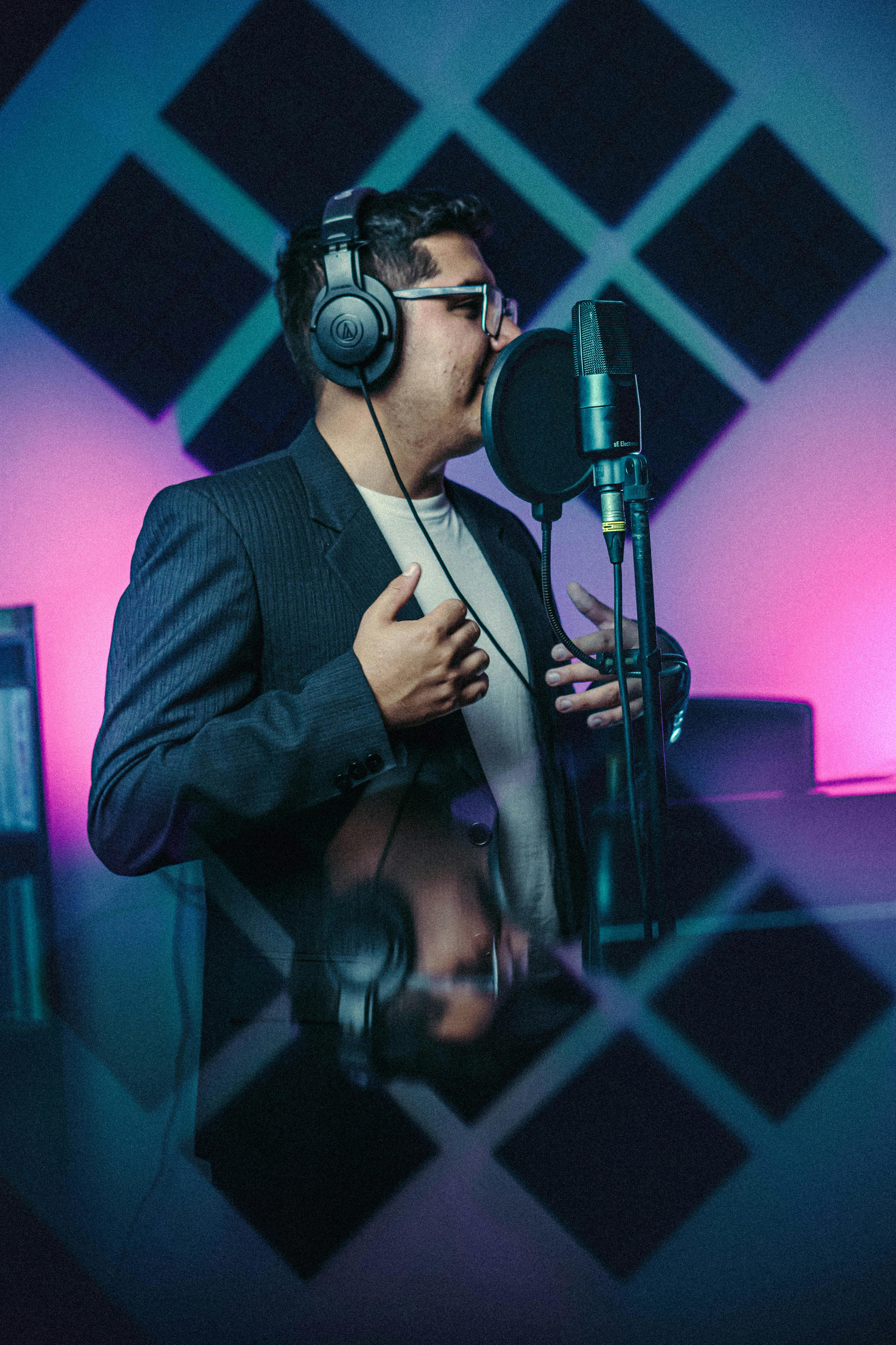 Male Singer in Recording Studio with Microphone · Free Stock Photo
