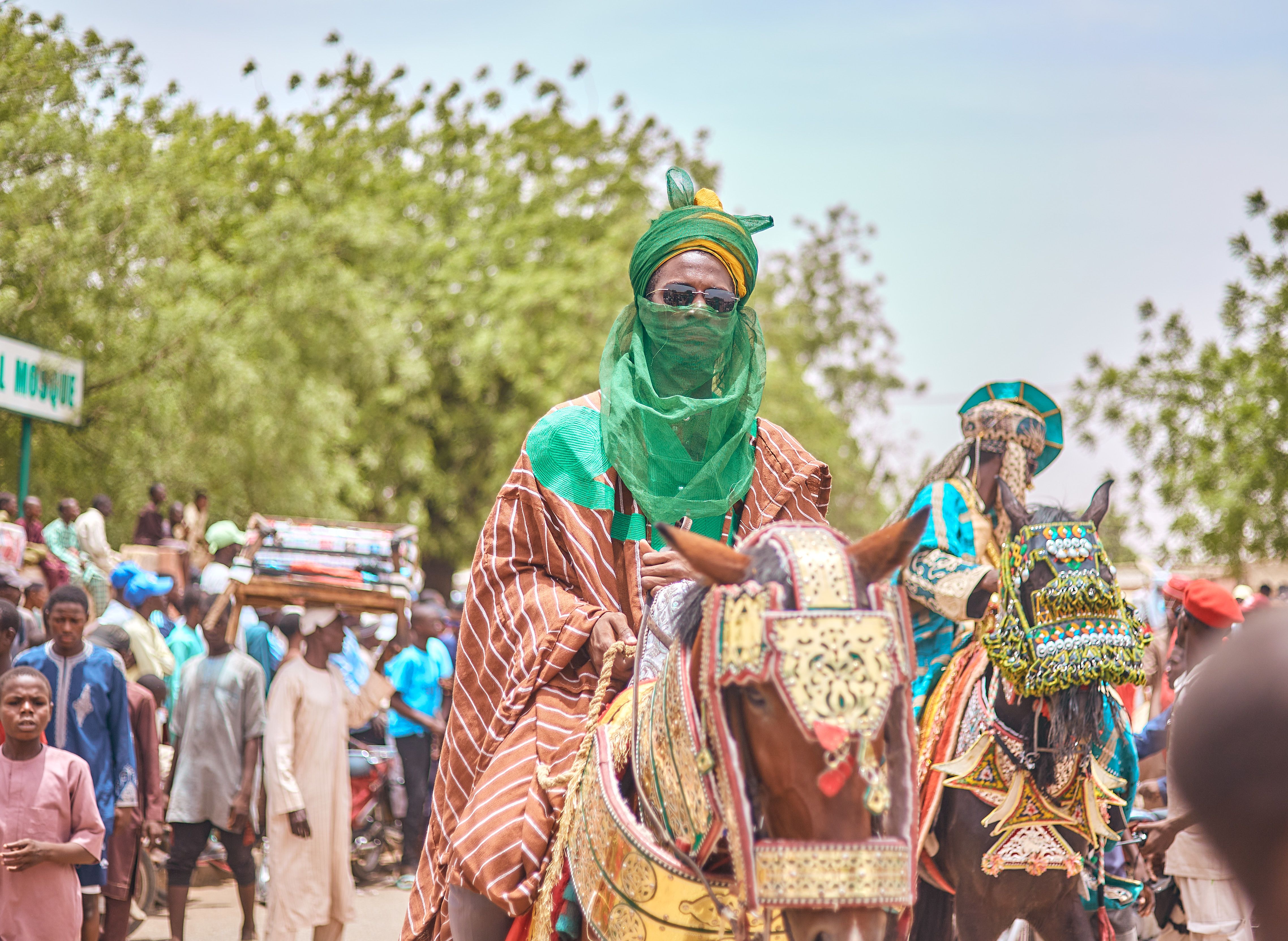 Colorful Horseman in Traditional African Parade · Free Stock Photo