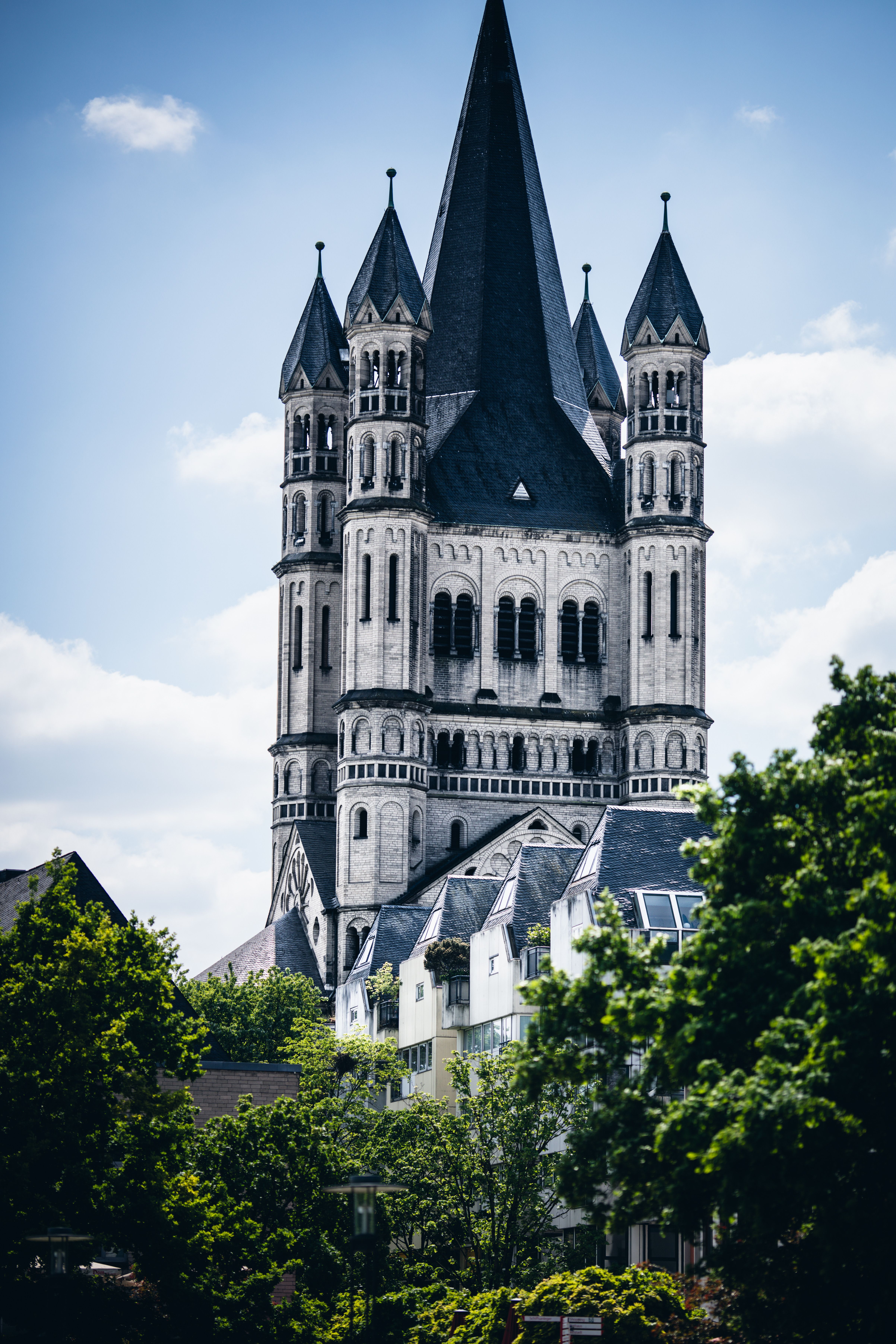 Historic Church Tower Surrounded by Trees · Free Stock Photo