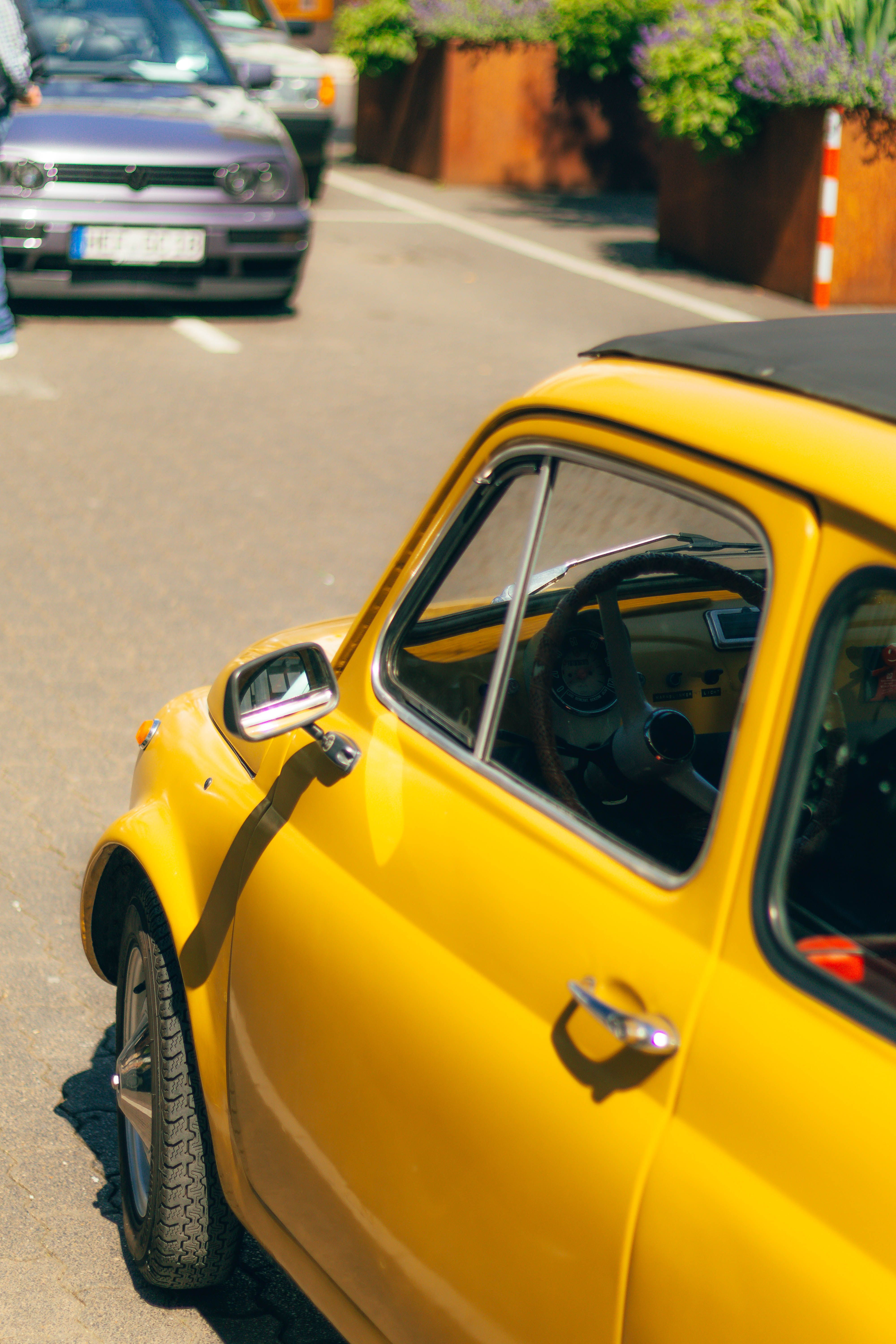 Vintage Yellow Car at Outdoor Auto Show · Free Stock Photo