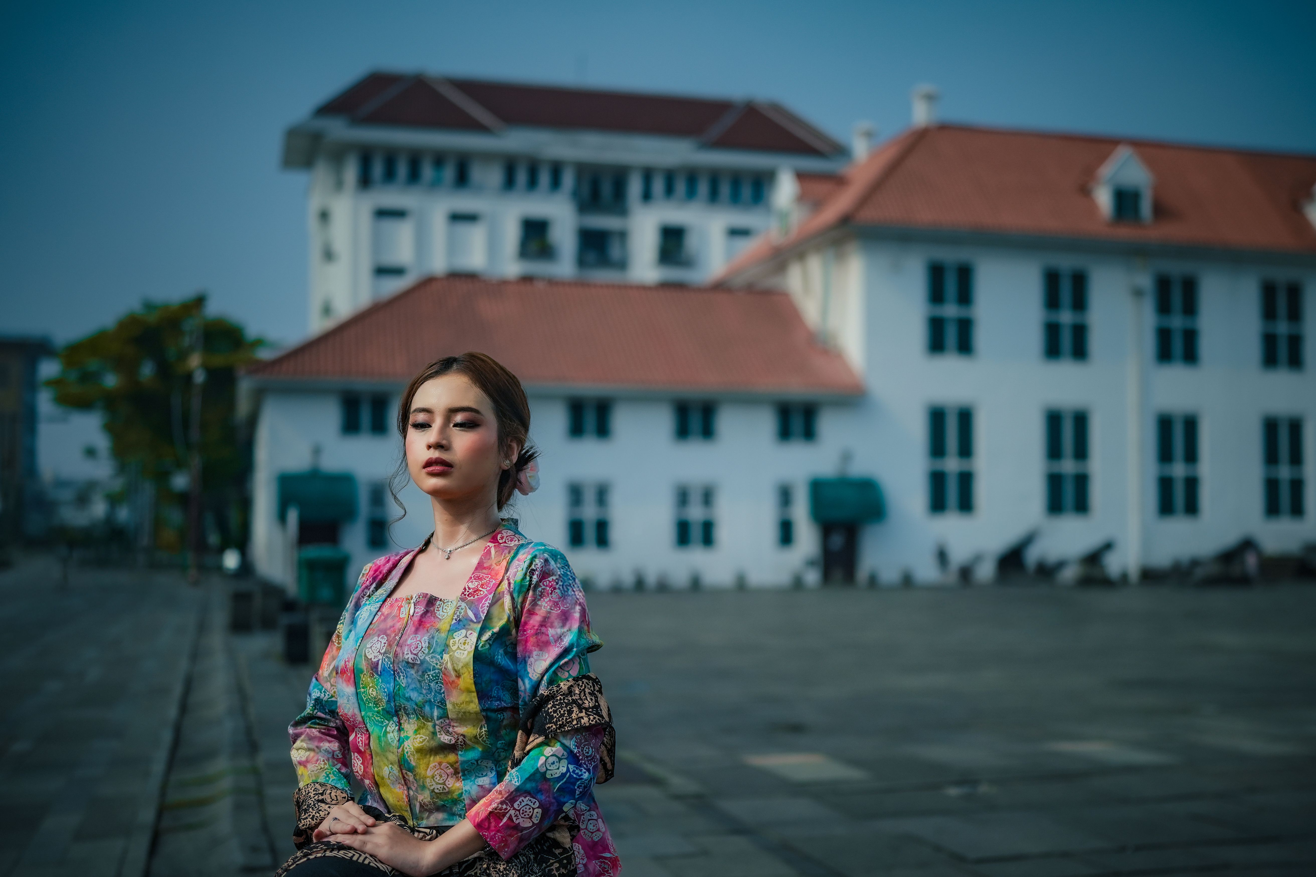 Indonesian Woman in Traditional Batik near Jakarta Landmark · Free ...