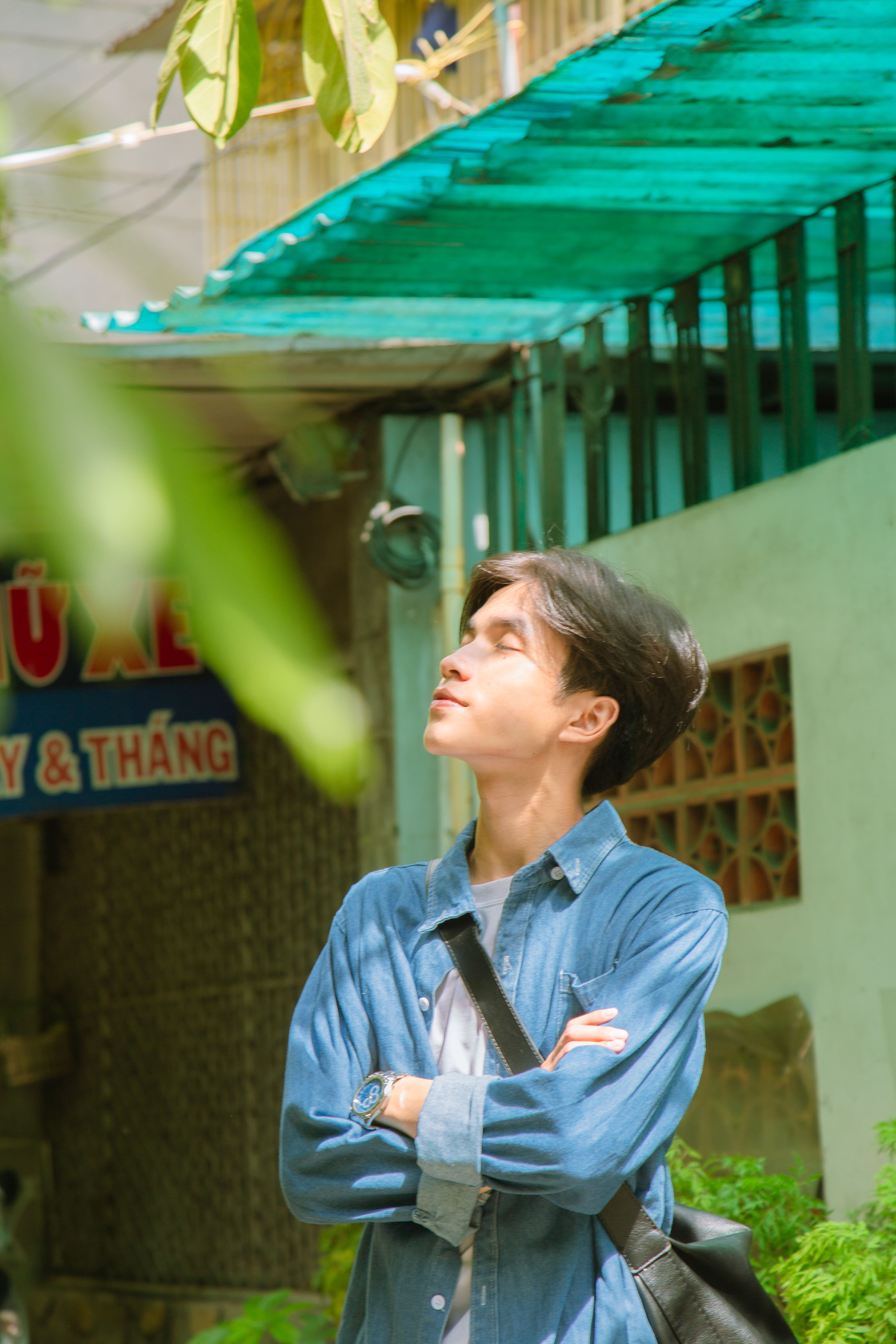 Man Enjoying Sunshine in Casual Outfit Outdoors · Free Stock Photo
