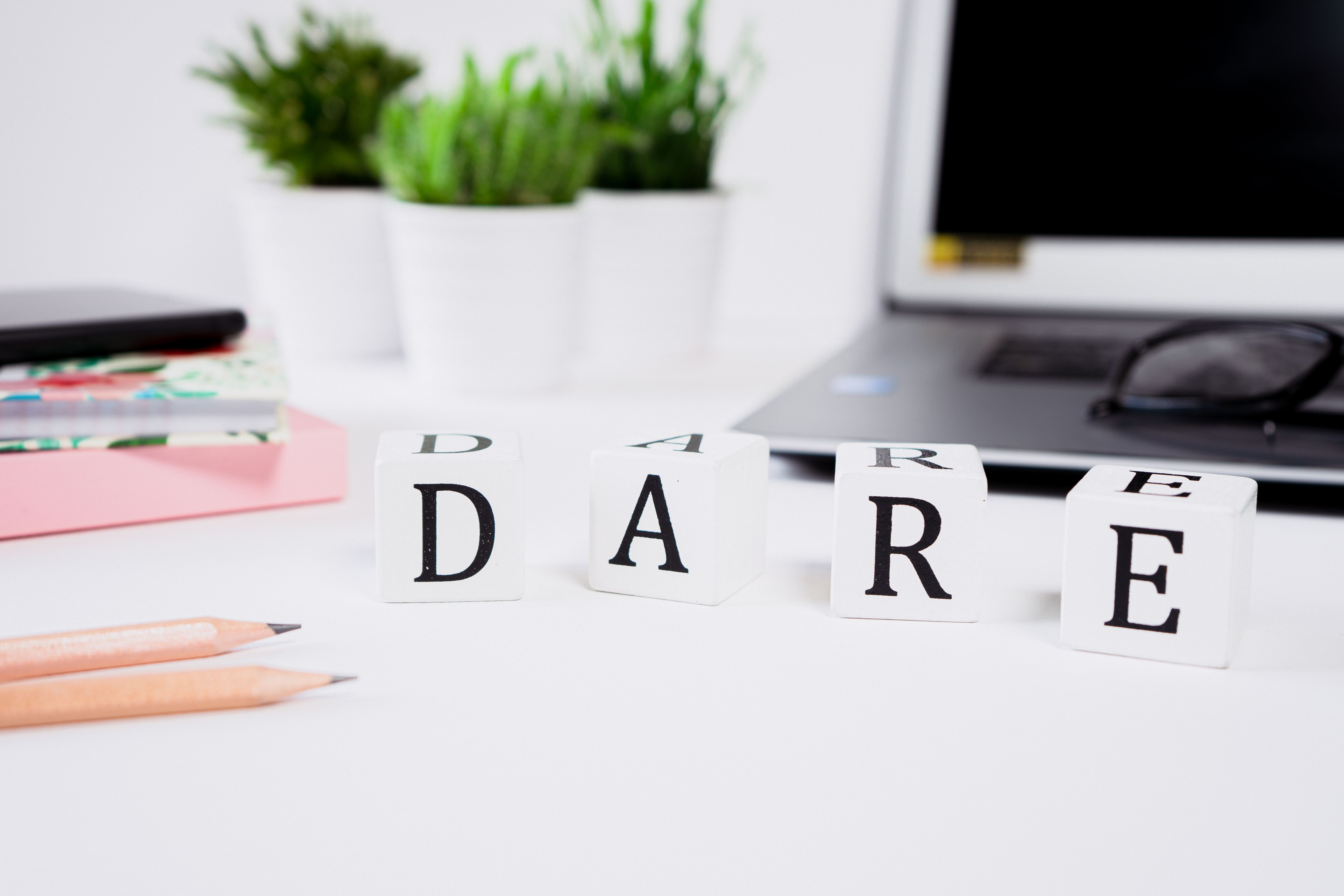Minimalist Office Desk with Dare Blocks · Free Stock Photo