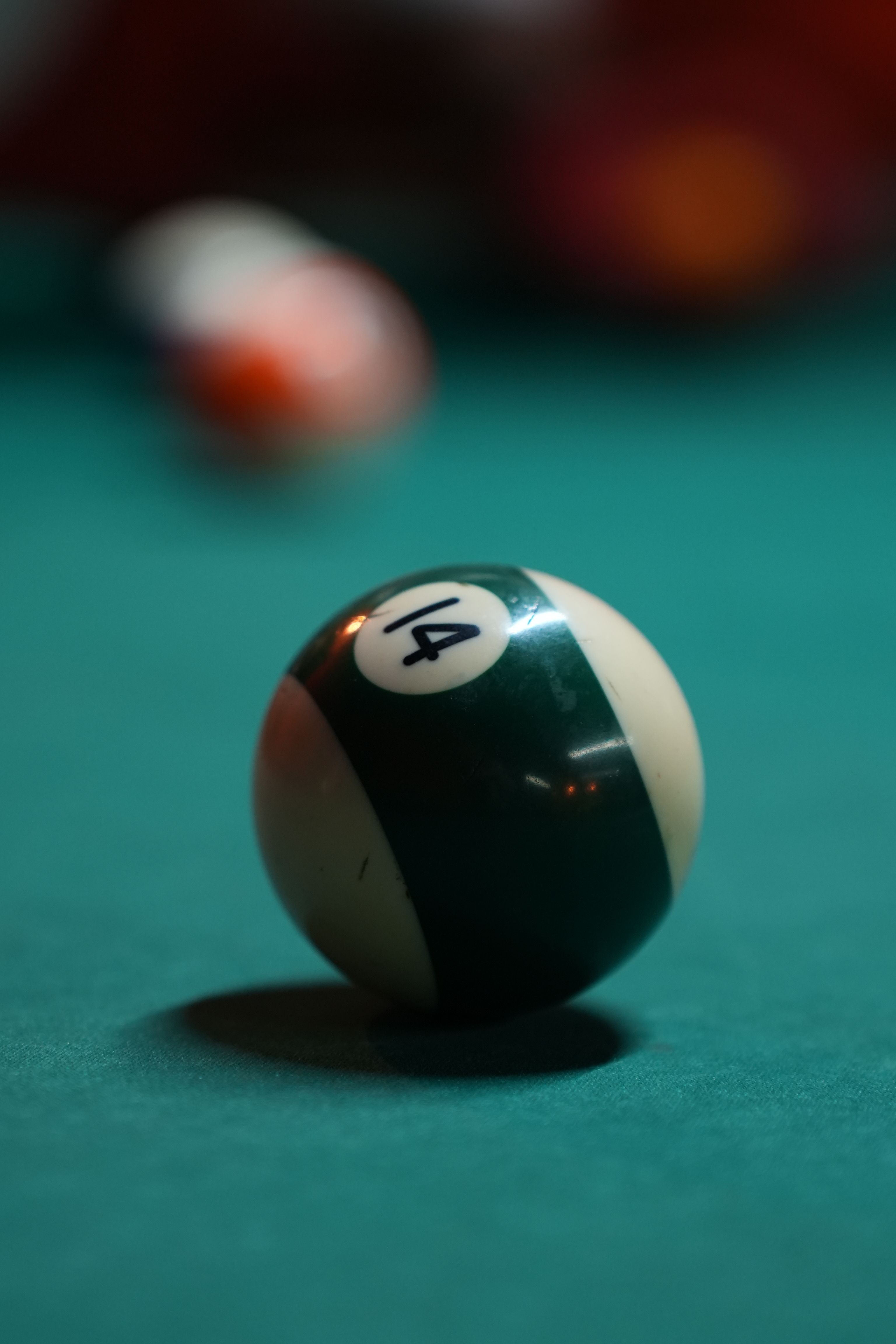 Close-Up of a Number 14 Billiard Ball · Free Stock Photo