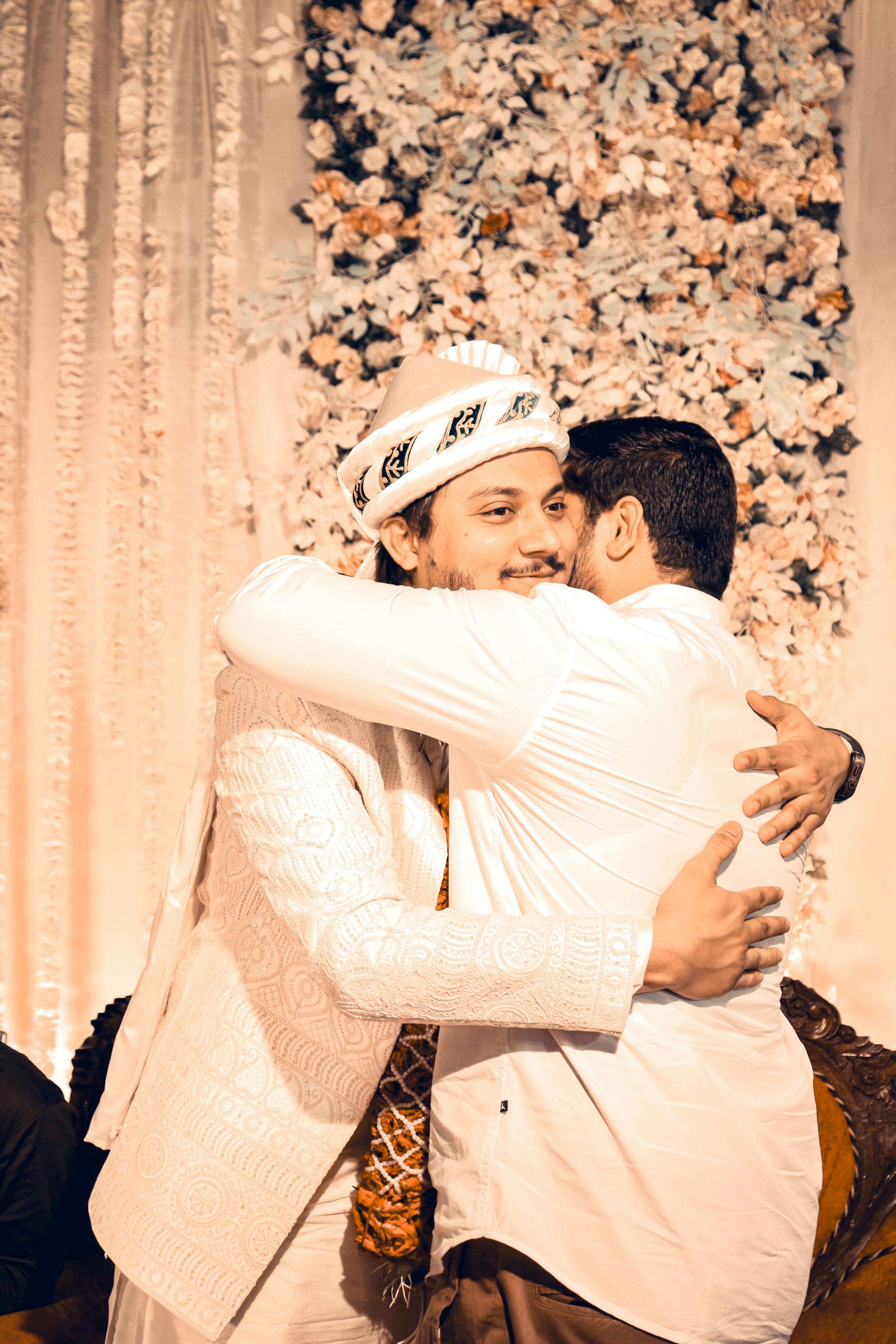 Embracing Happiness: A Traditional Indian Wedding Moment · Free Stock Photo