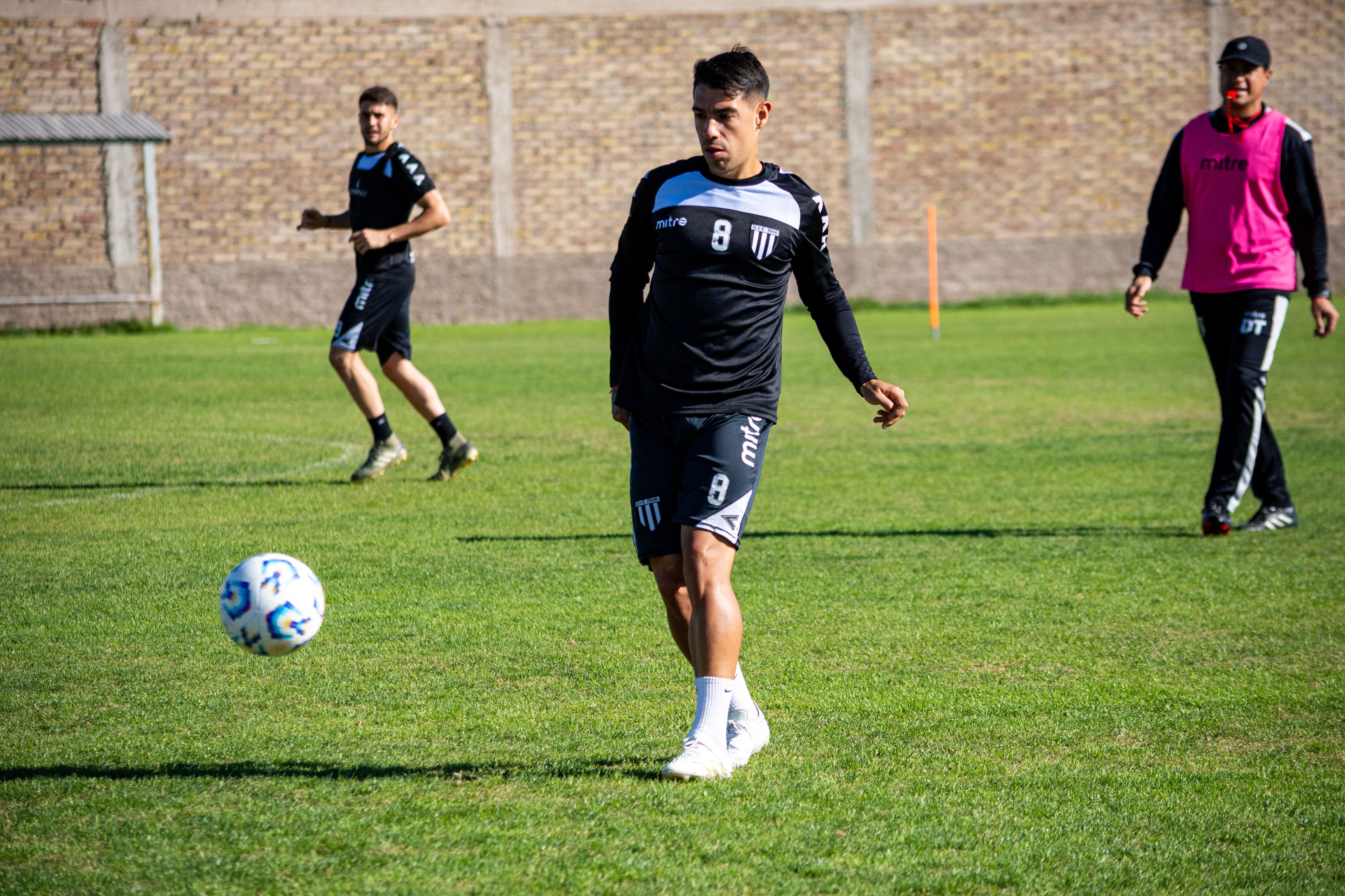 Football Player Training on Field During Daytime · Free Stock Photo