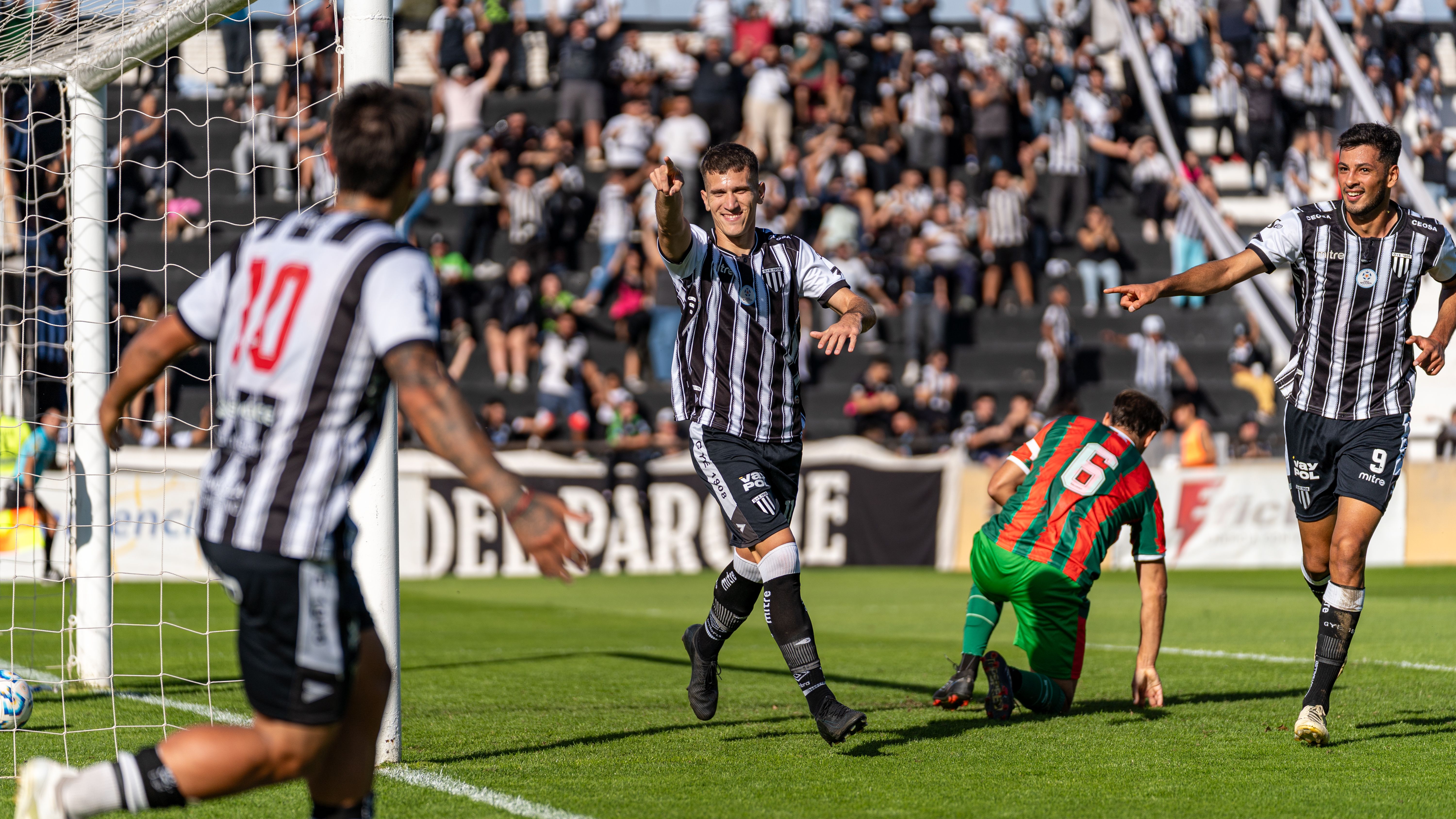 Soccer Players Celebrating Goal on Field · Free Stock Photo