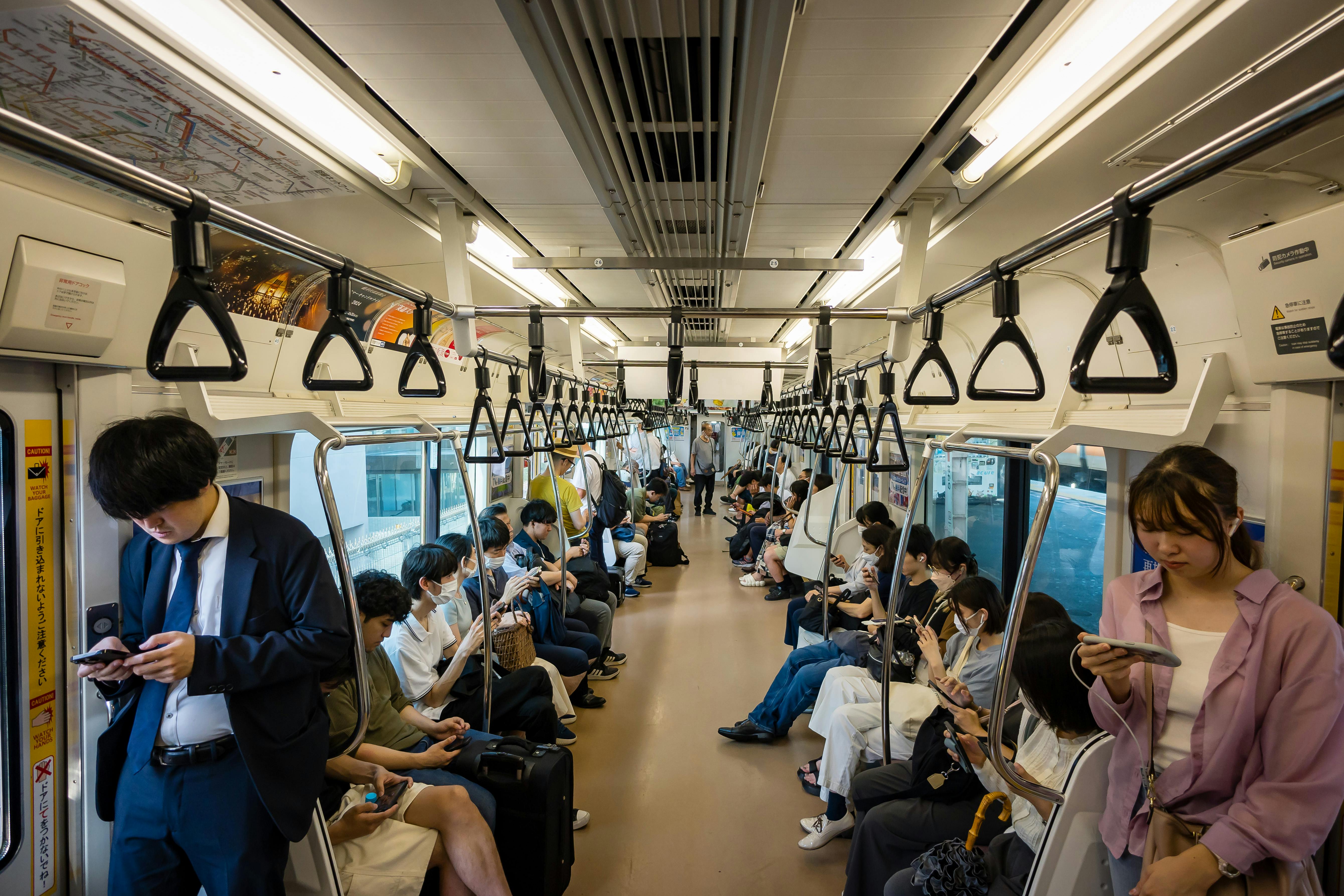 Busy Commuters on Japanese Subway Train · Free Stock Photo