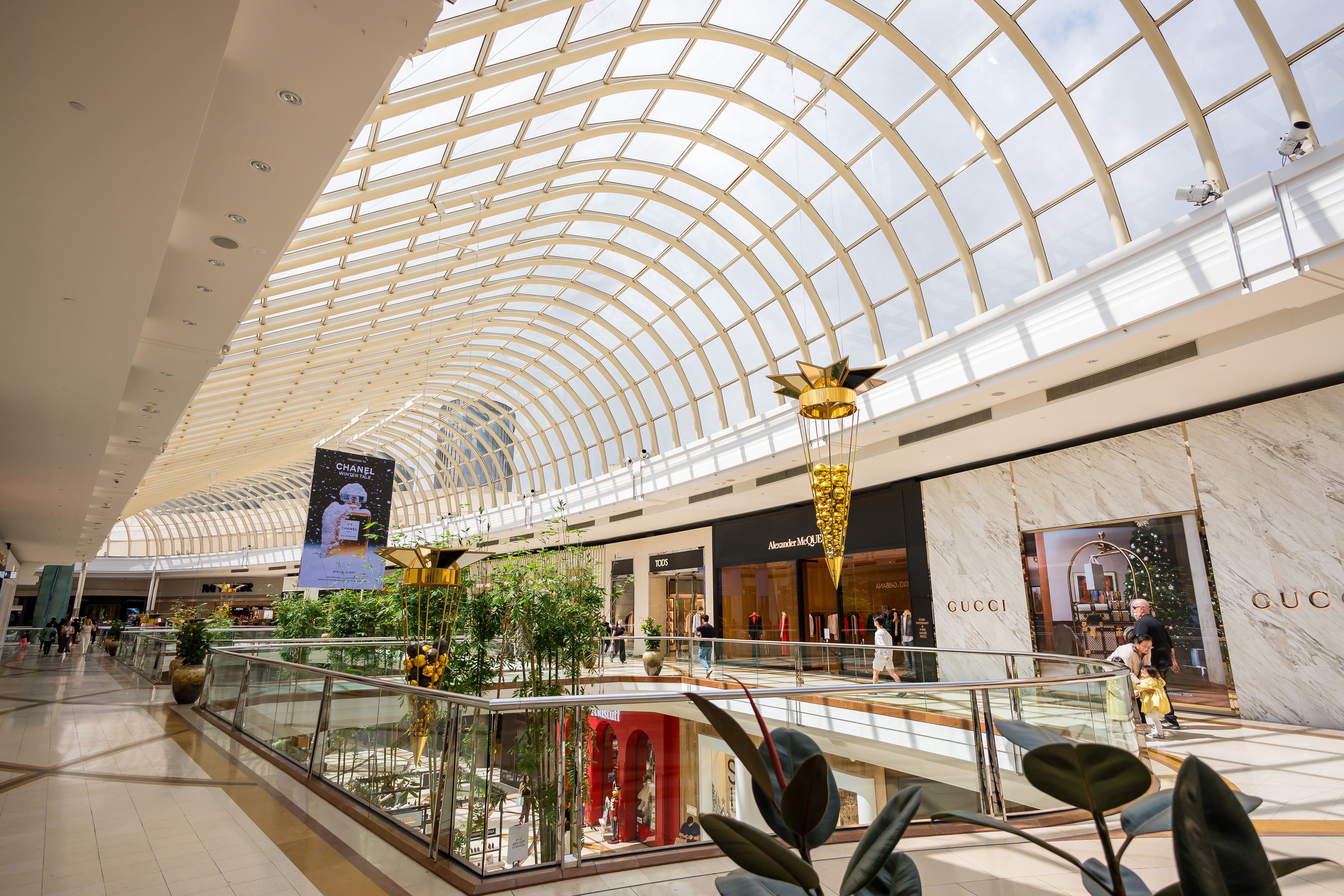 Modern Shopping Mall Interior with Glass Roof · Free Stock Photo