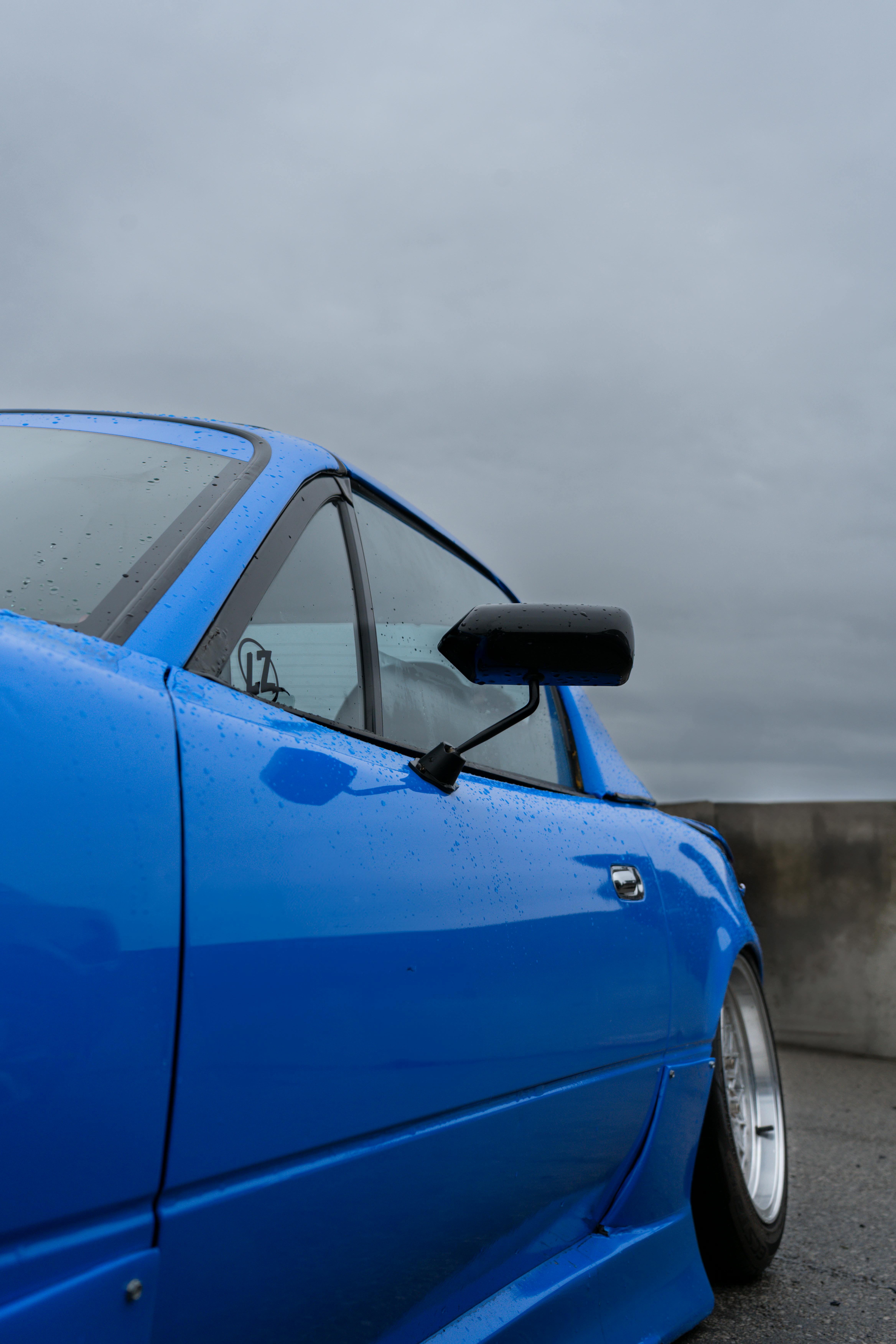 Blue Modified Car on Rainy Toronto Day · Free Stock Photo
