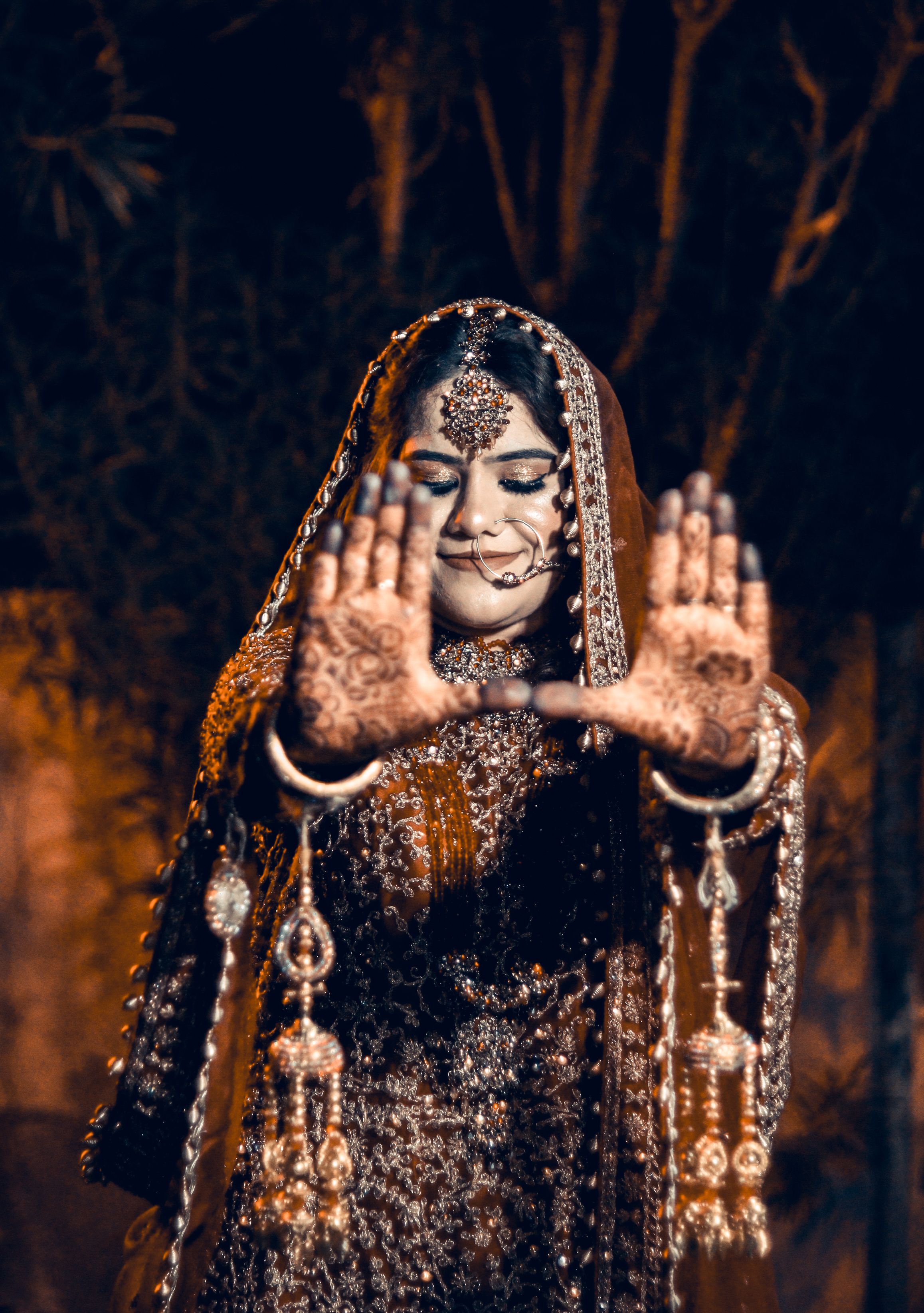 Elegant Indian Bride Highlighting Henna Design · Free Stock Photo
