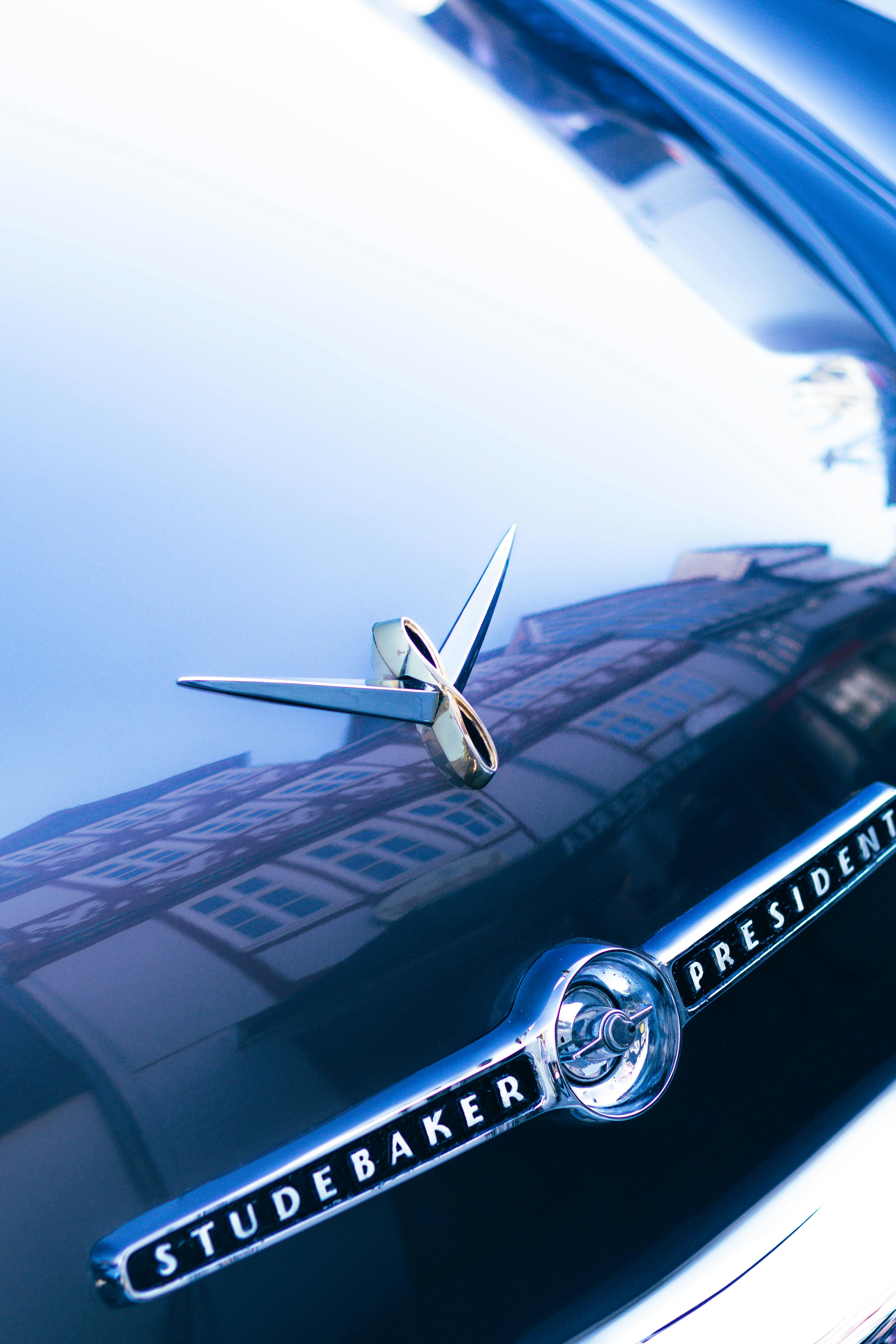 Close-up of Studebaker President Car Emblem · Free Stock Photo
