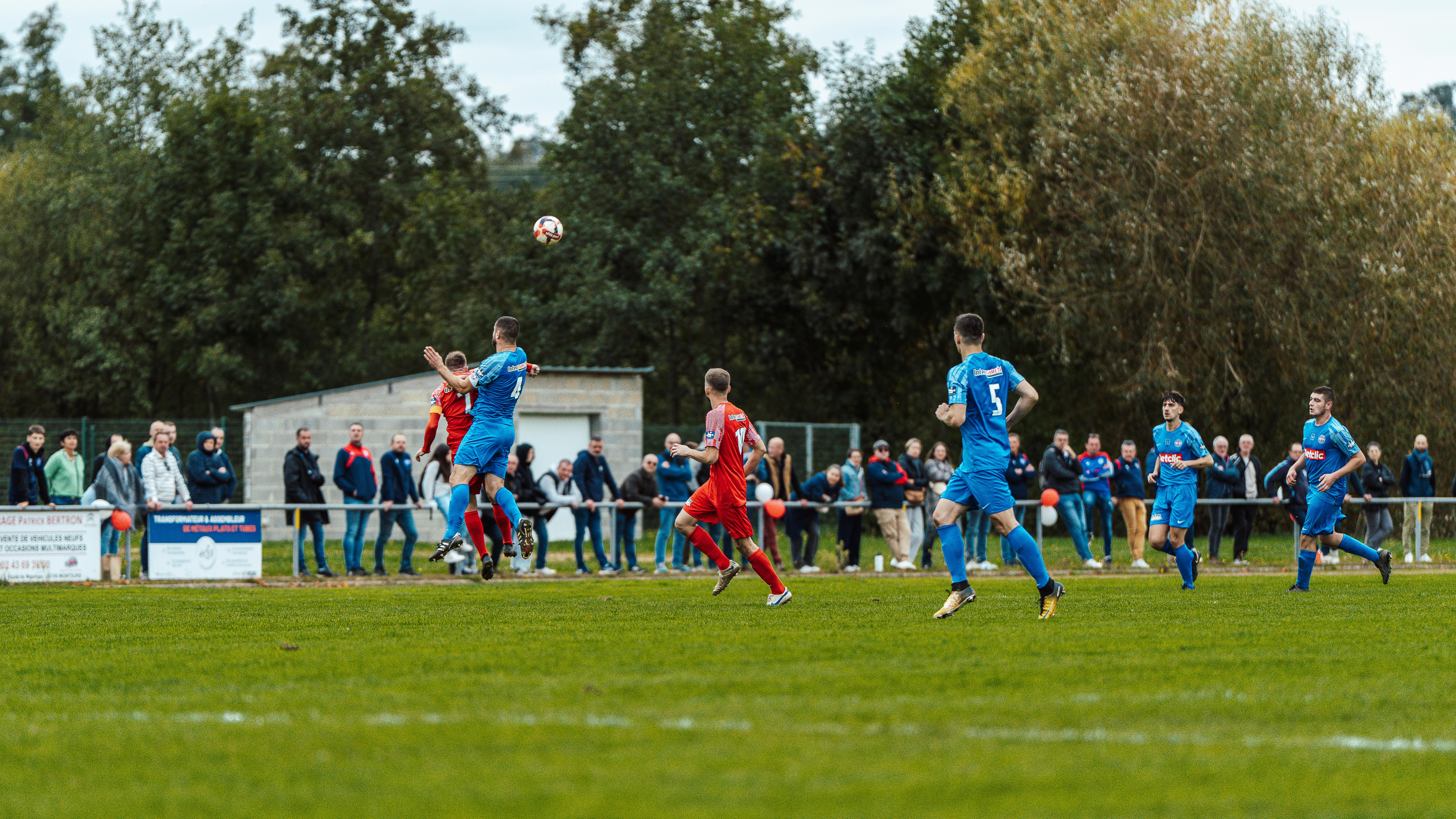 Exciting Football Match Action in France · Free Stock Photo