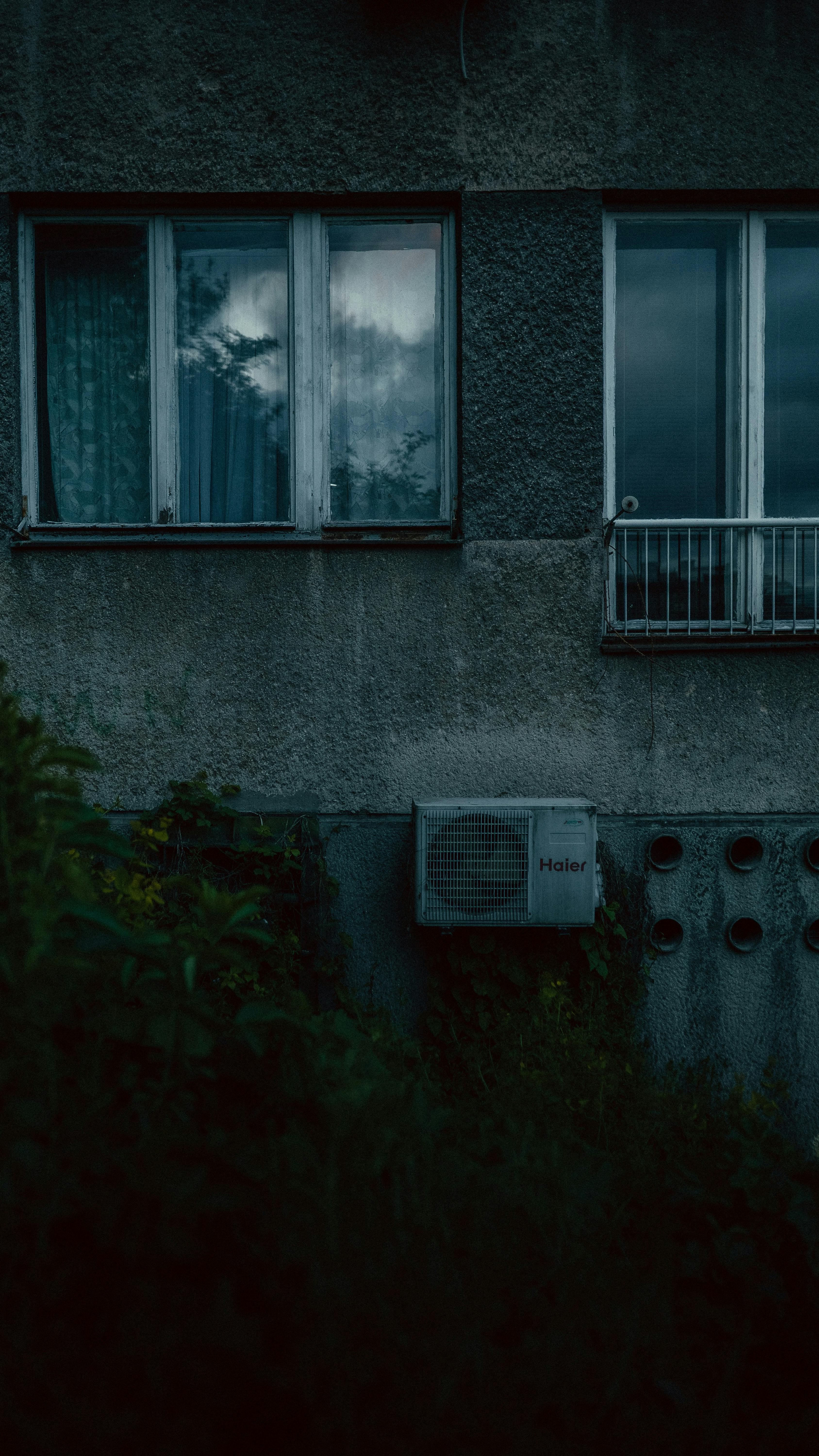Dimly Lit Exterior of an Urban Apartment · Free Stock Photo