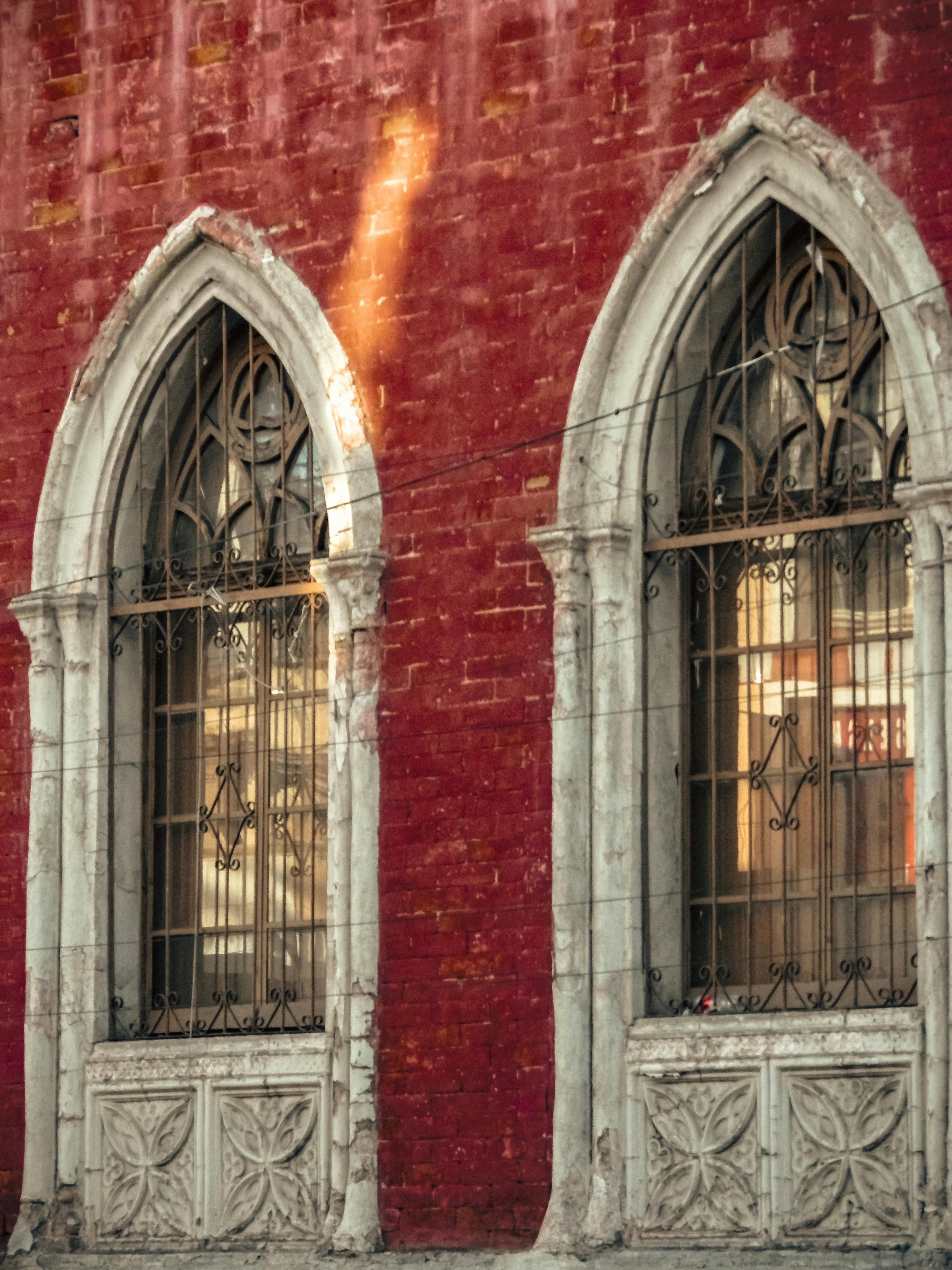 Gothic Architecture Windows on Red Brick Wall · Free Stock Photo