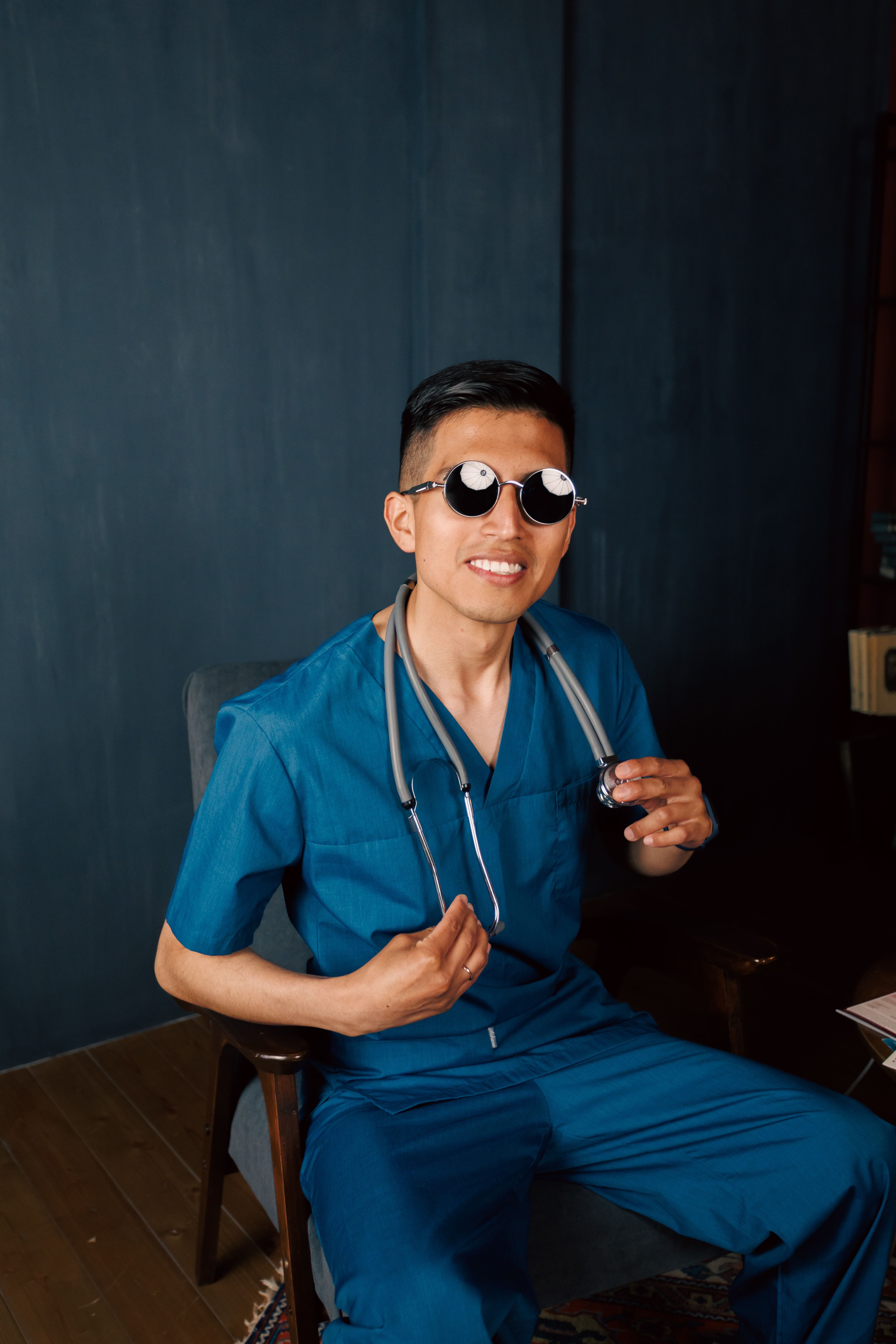Smiling Medical Professional in Blue Scrubs with Stethoscope · Free ...