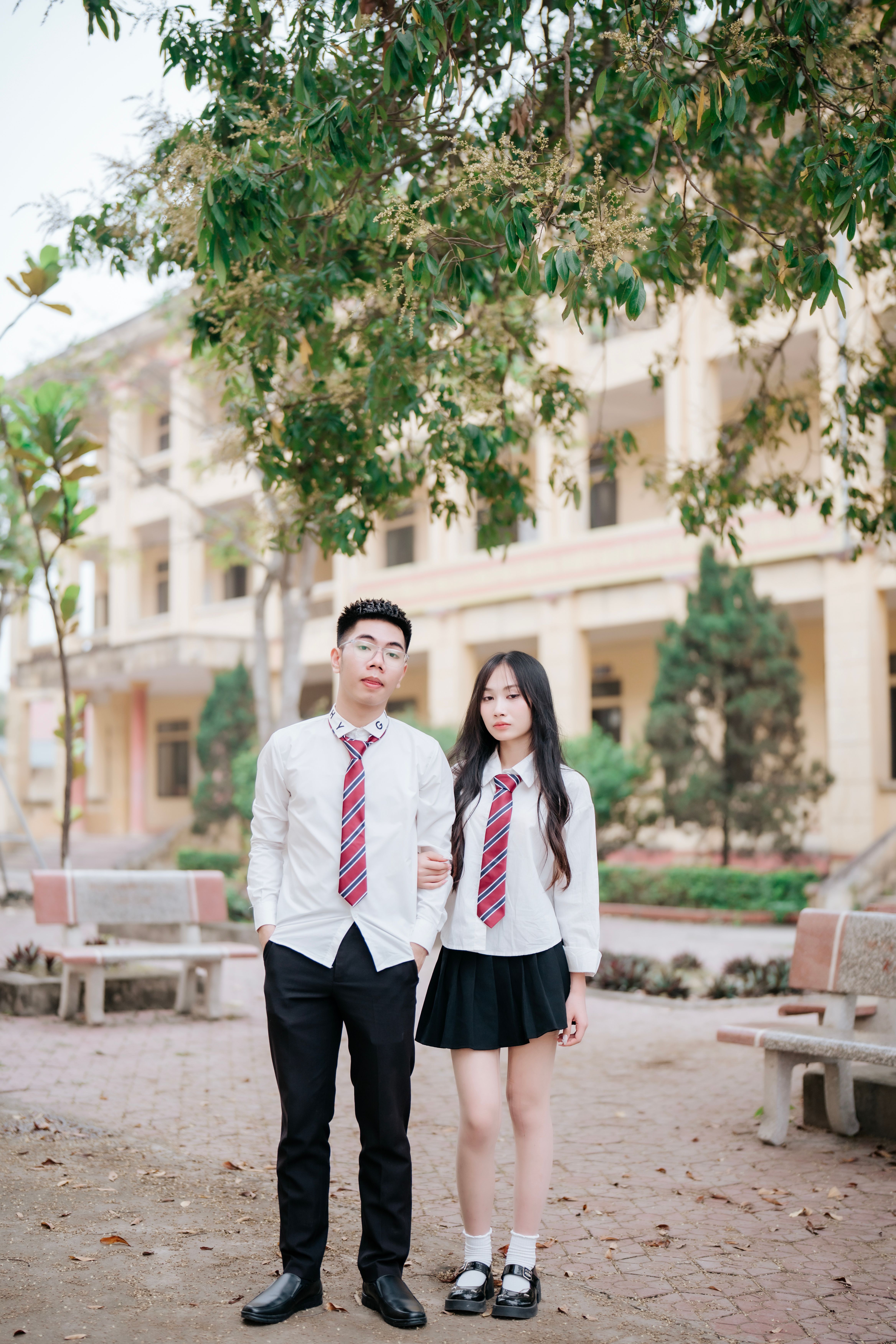 Group of High School Students in Uniform Outdoors · Free Stock Photo
