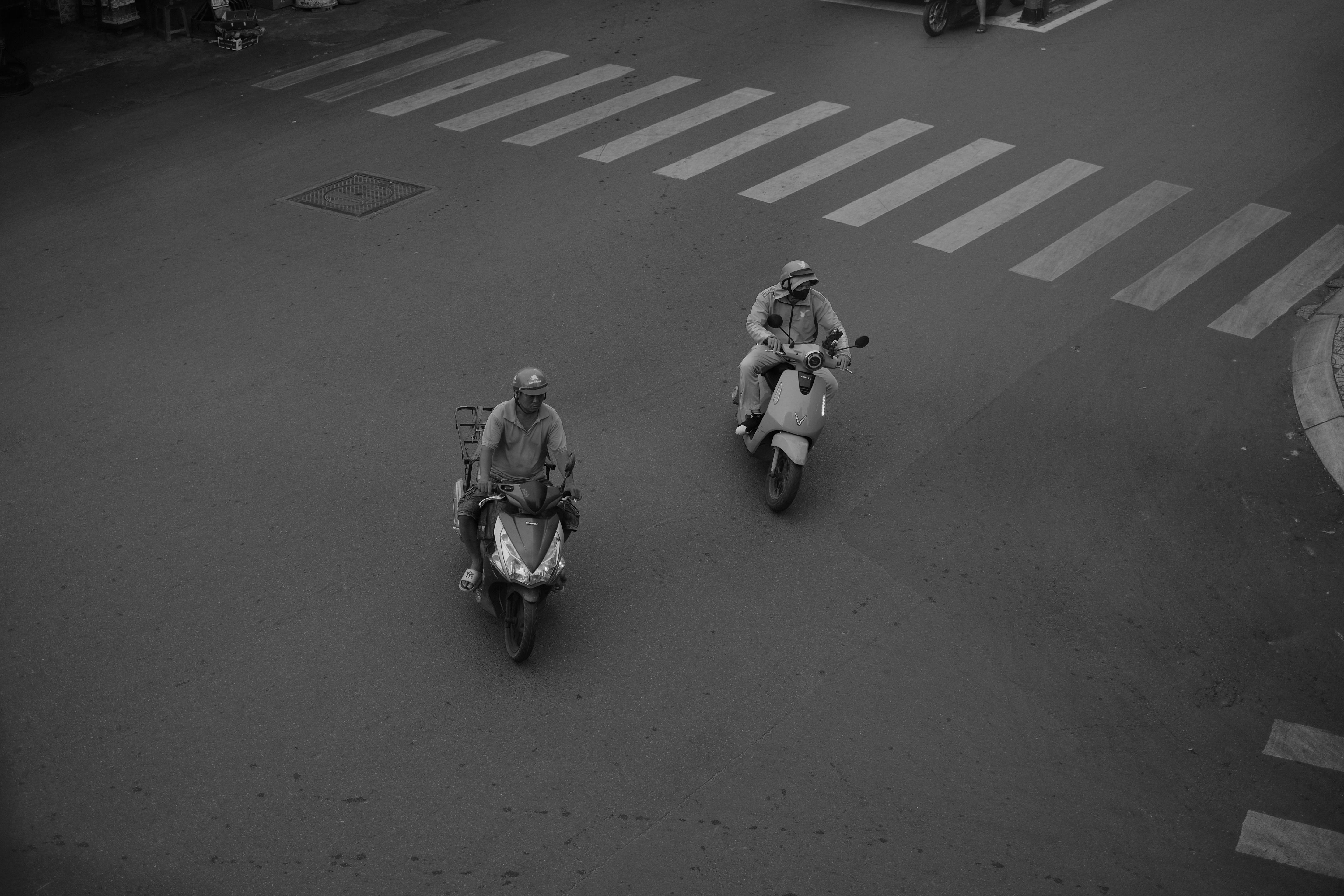 Aerial View of Two Motorcyclists on Urban Street · Free Stock Photo
