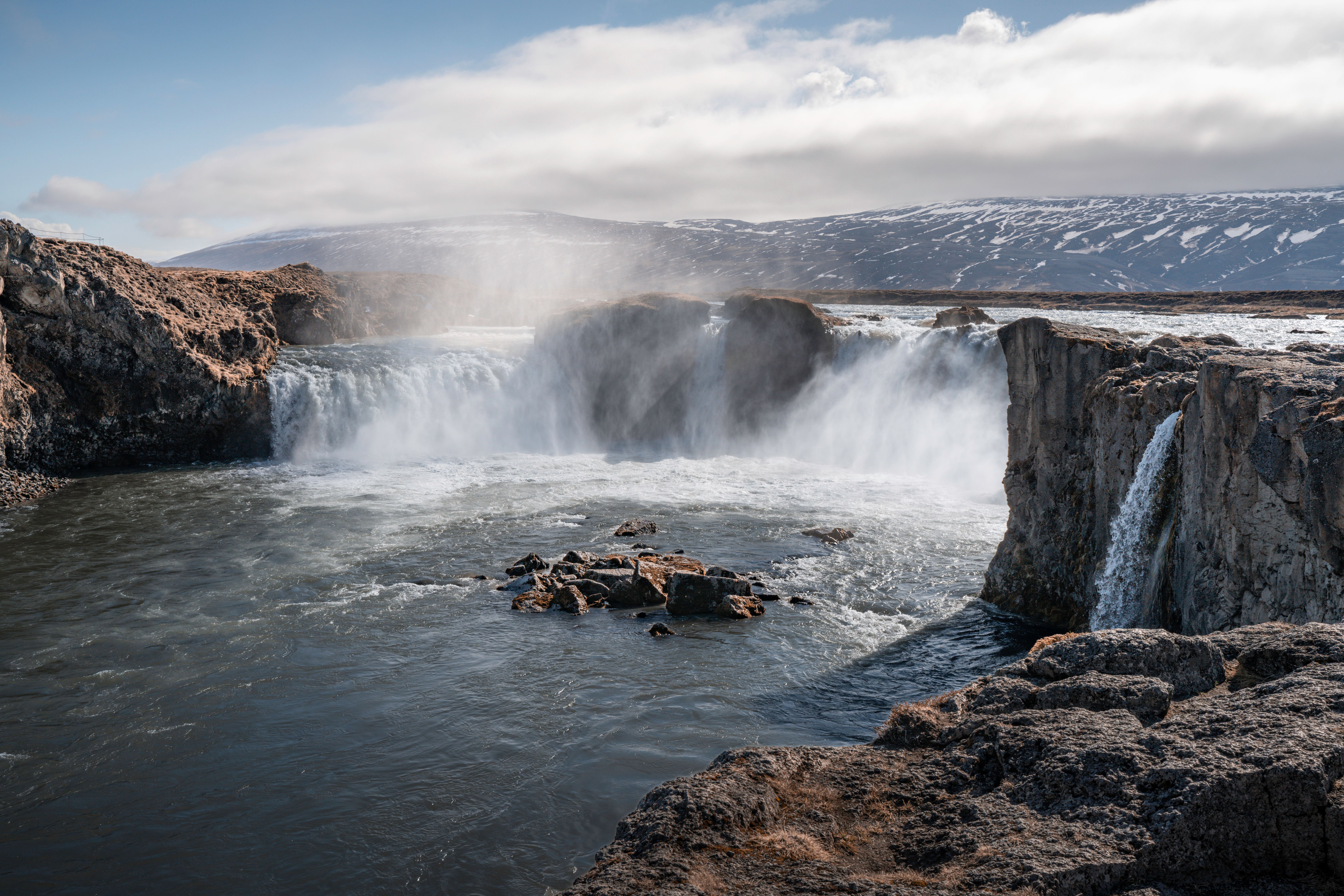 Dramatic Icelandic Waterfall in Springtime · Free Stock Photo