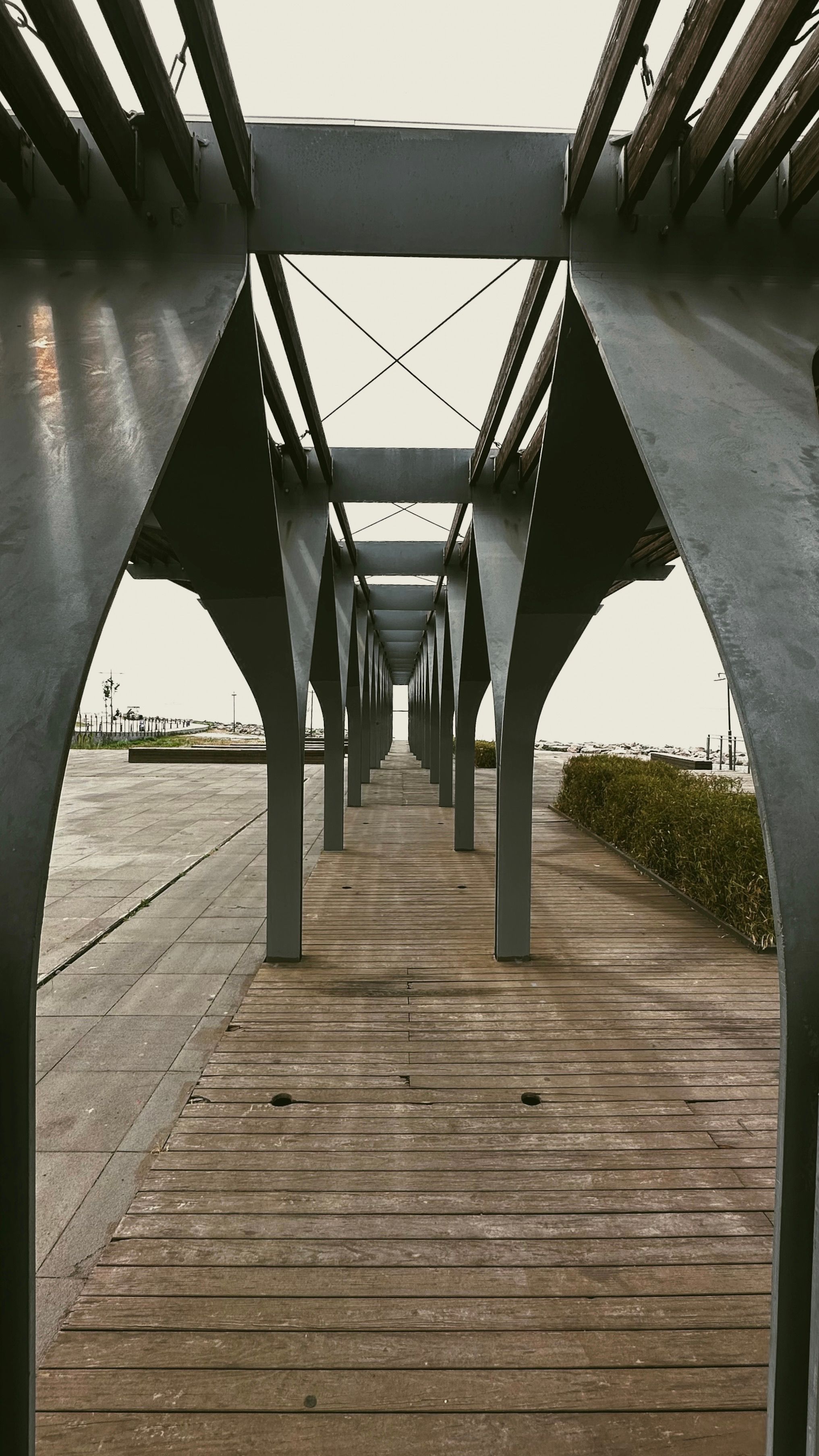 Symmetrical Modern Steel Bridge Walkway Perspective · Free Stock Photo