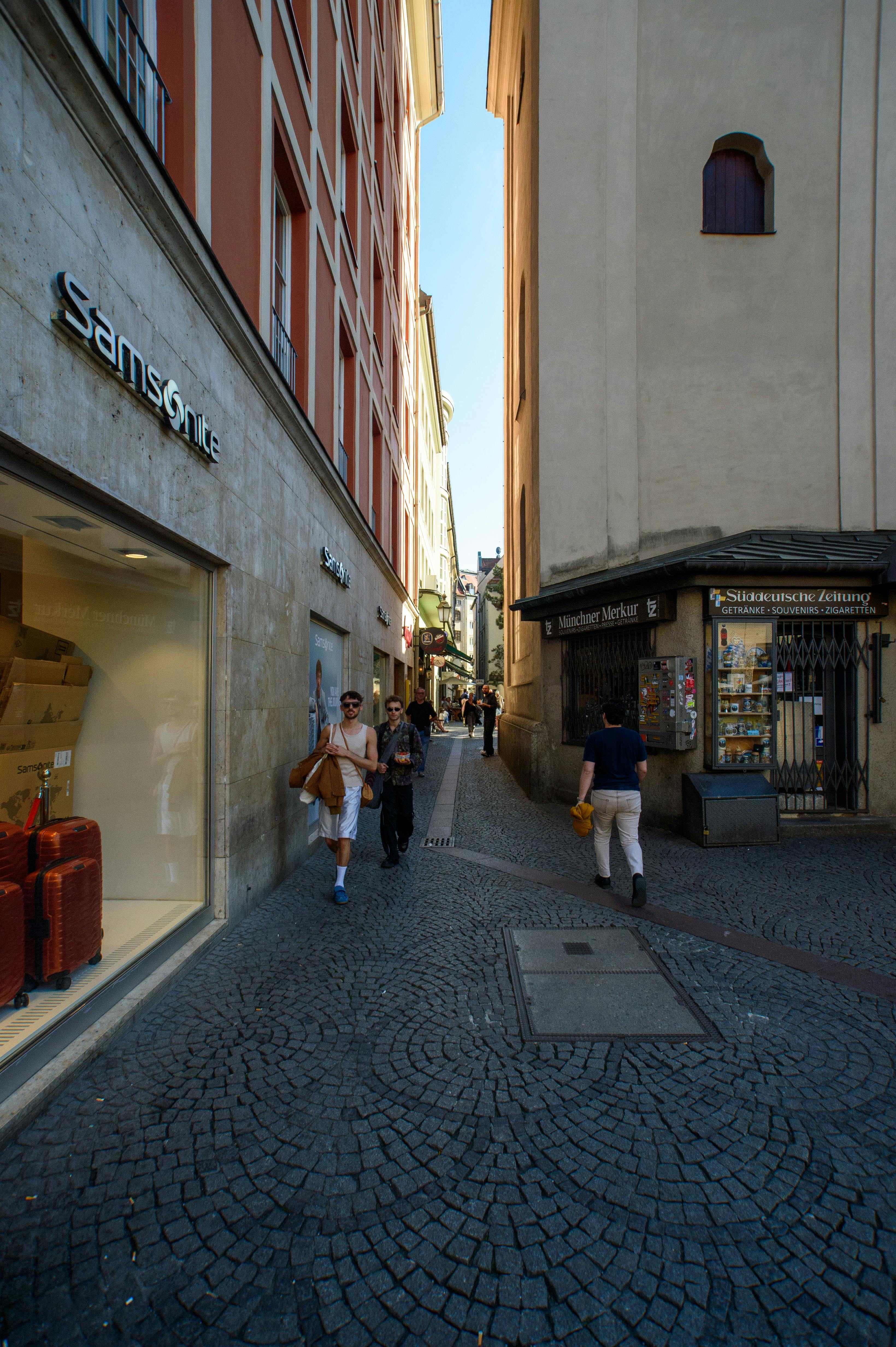 Charming European Cobblestone Street View · Free Stock Photo