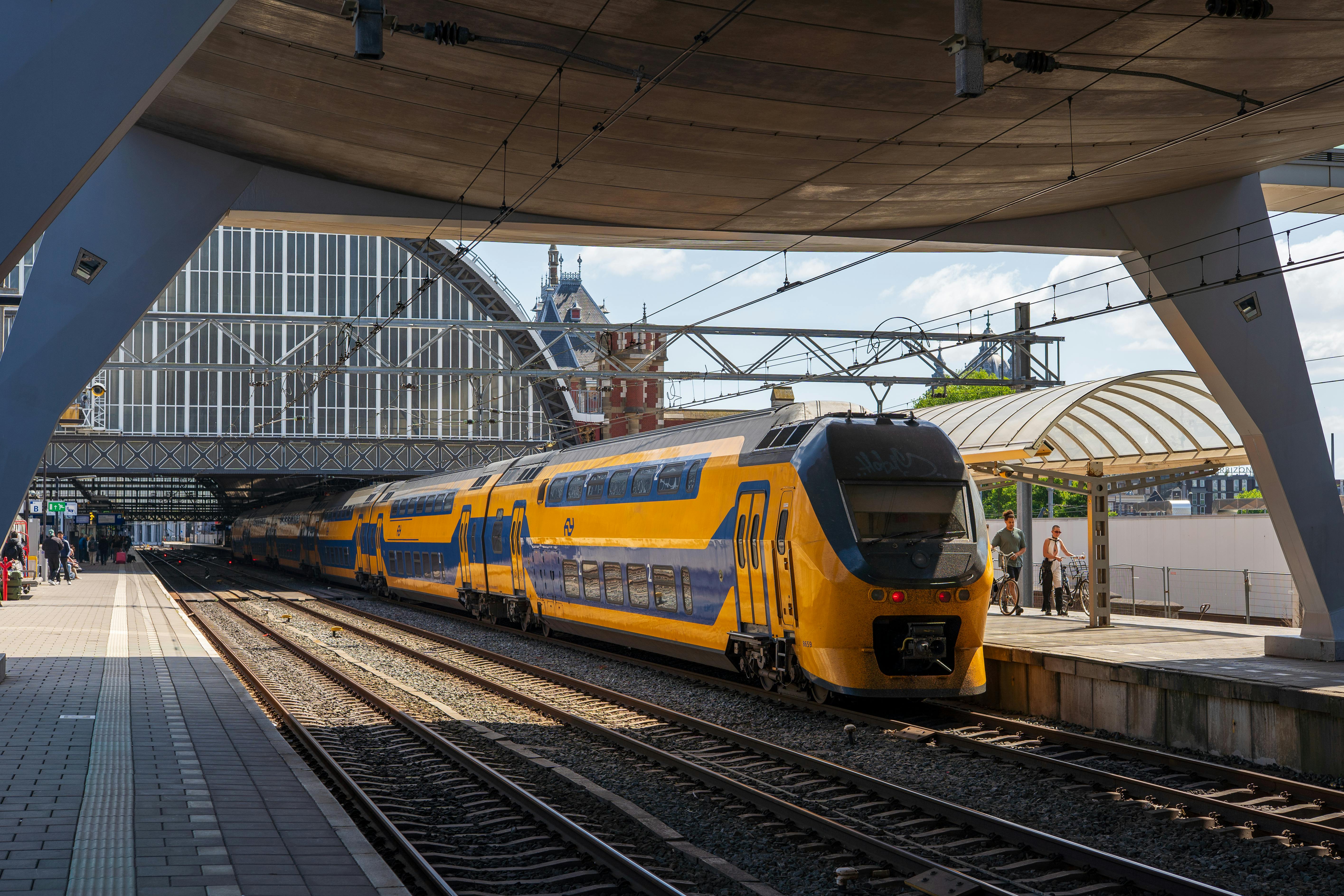 Modern Double Decker Train at Amsterdam Station · Free Stock Photo