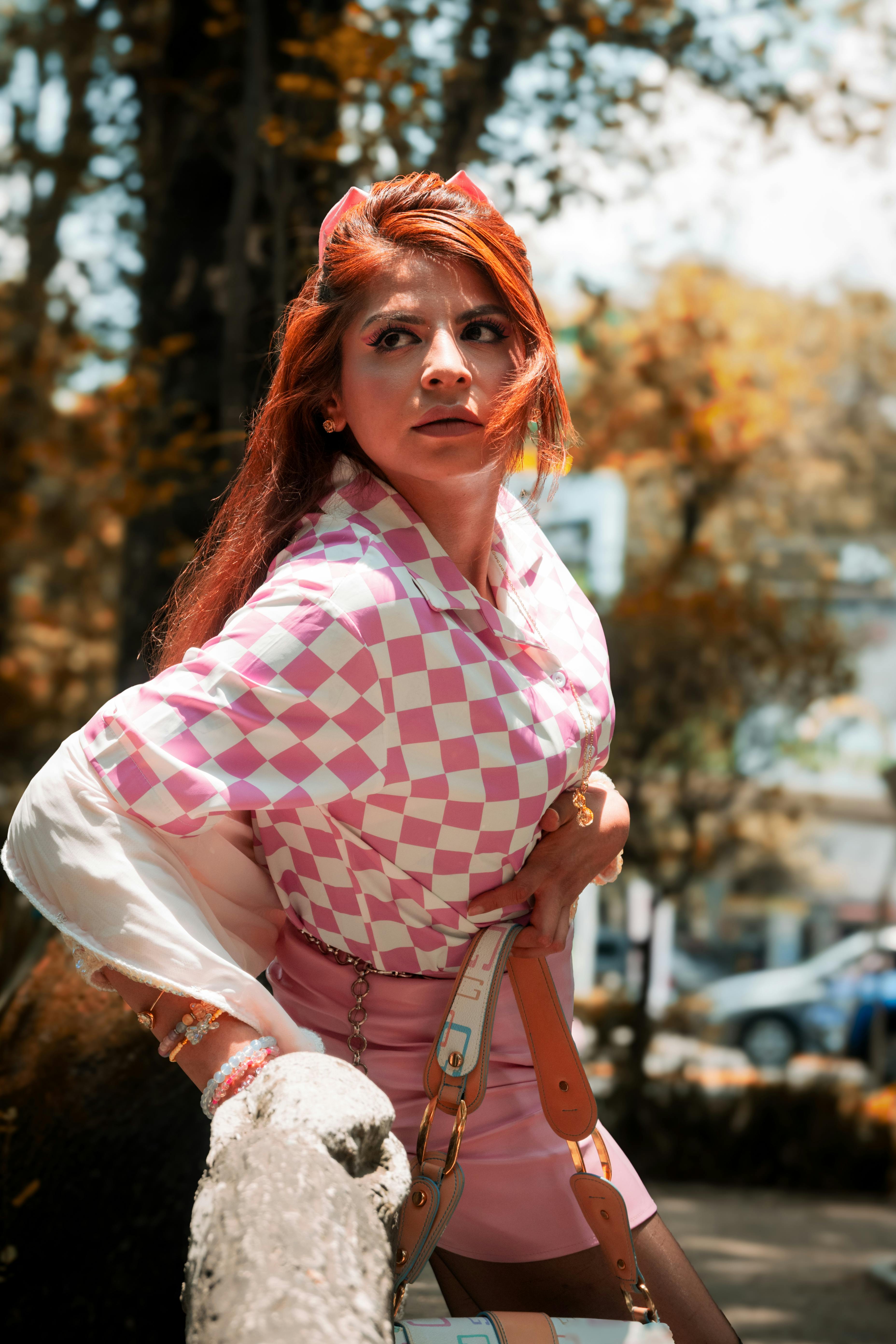 Stylish Woman in Pink Checkered Outfit Outdoors · Free Stock Photo