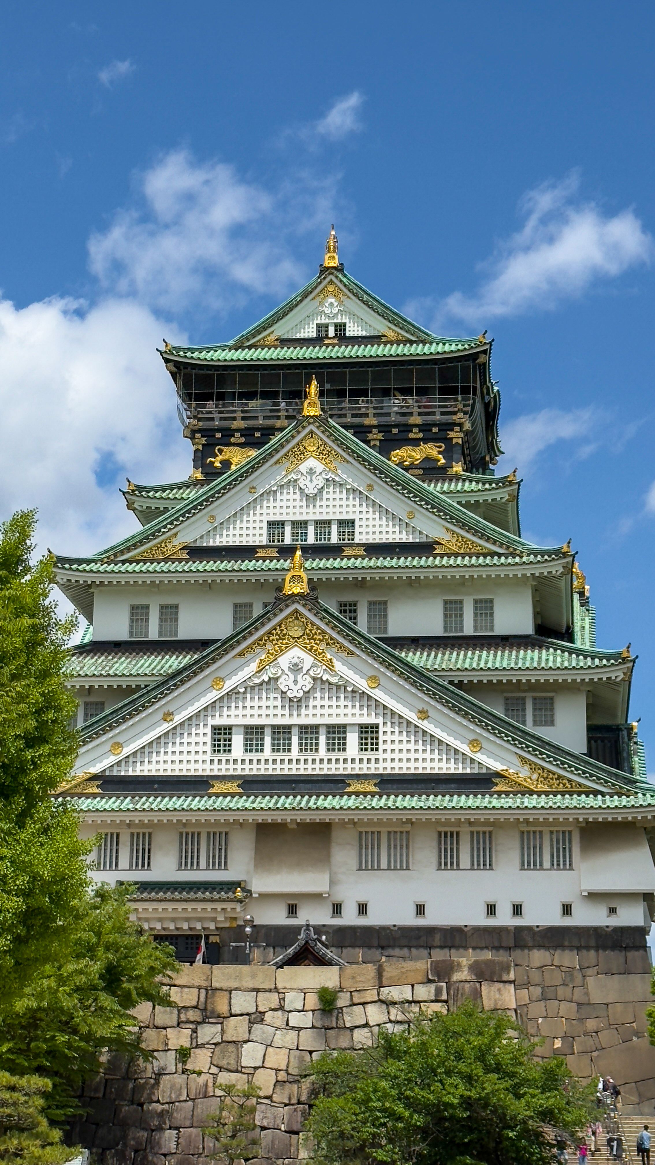 Majestic Osaka Castle Against Clear Blue Sky · Free Stock Photo