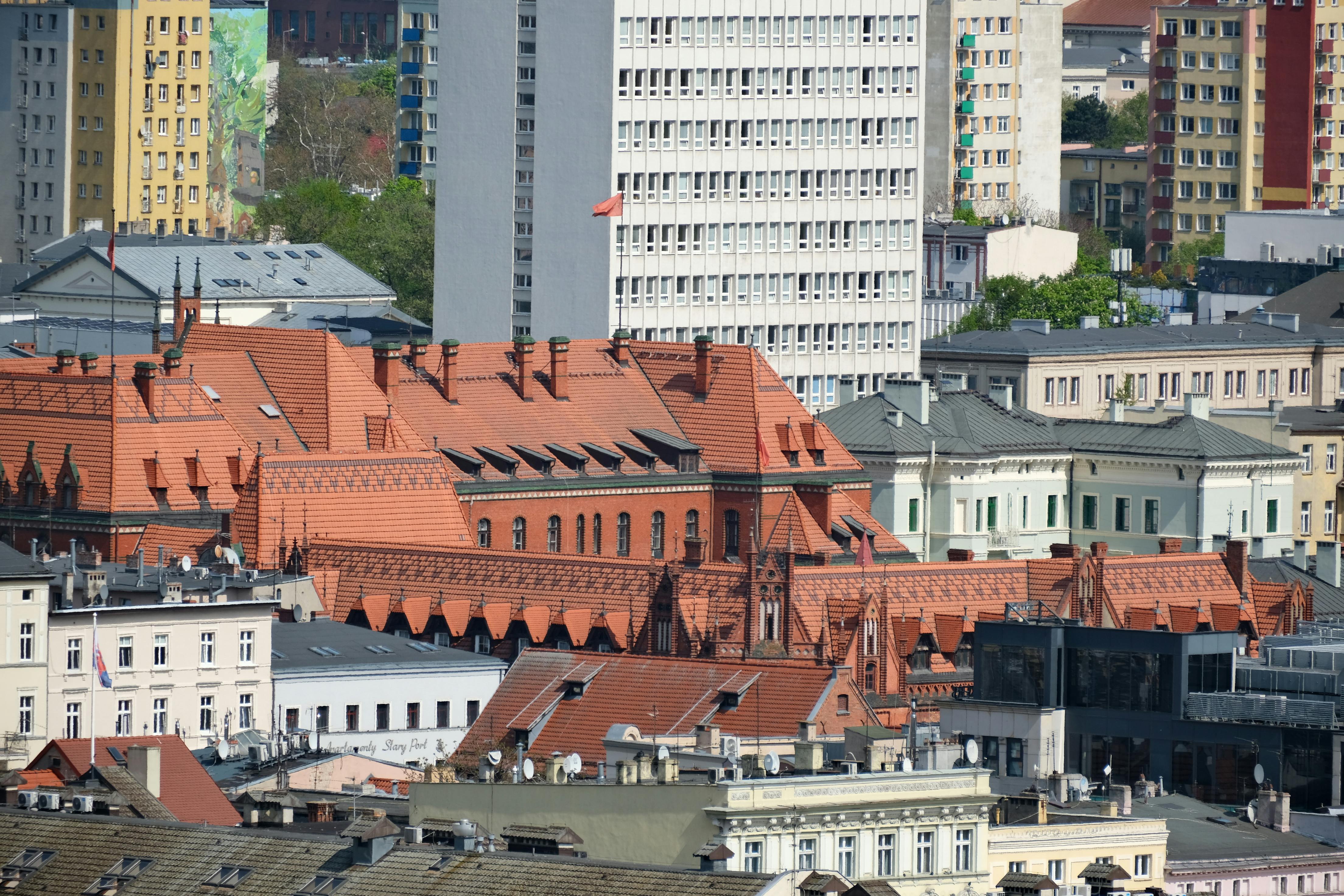 Aerial View of Urban Architecture with Red Tile Roofs · Free Stock Photo